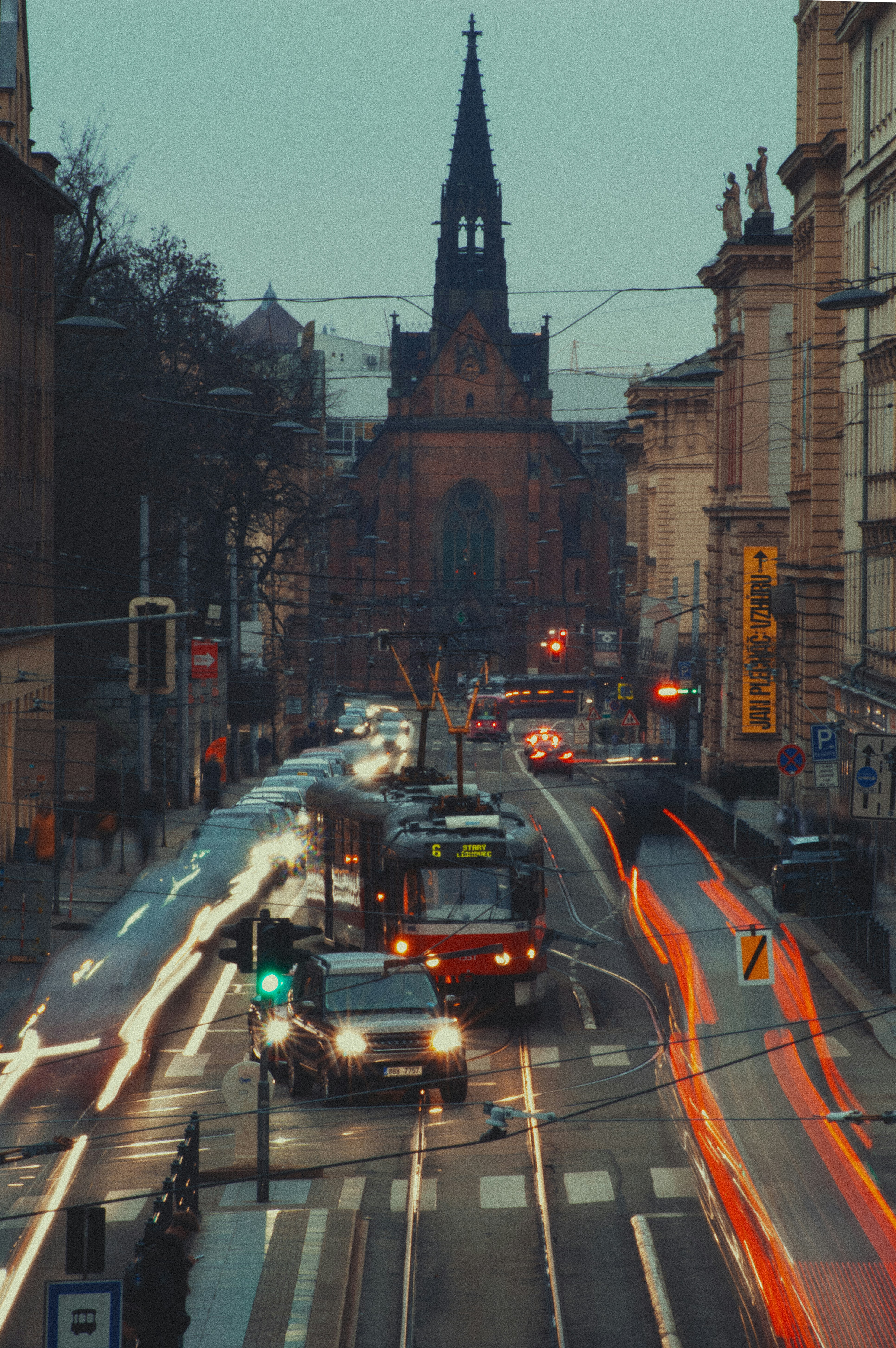 City Tram Lights Through a Gothic Street