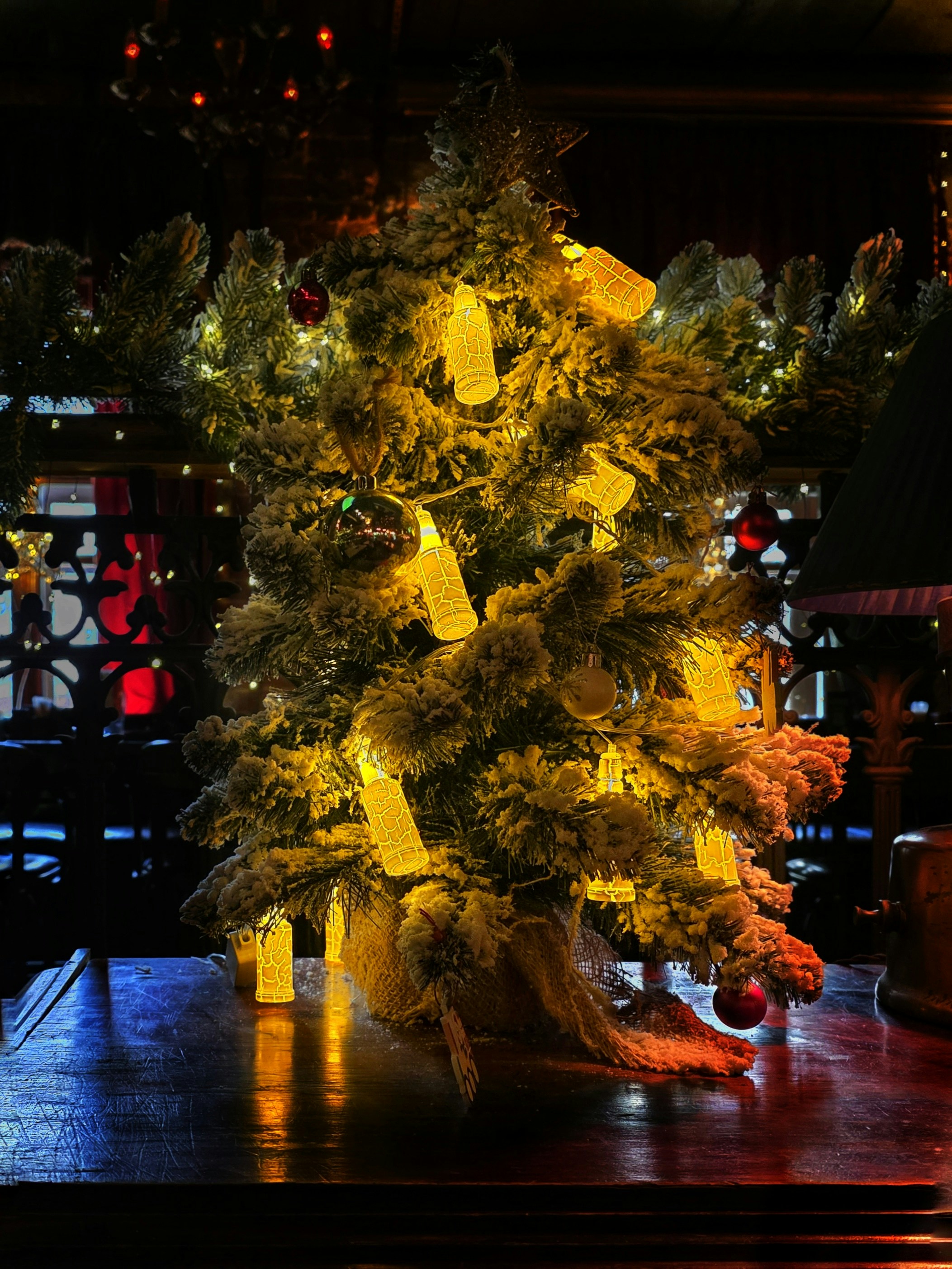 A decorated christmas tree with glowing lights.