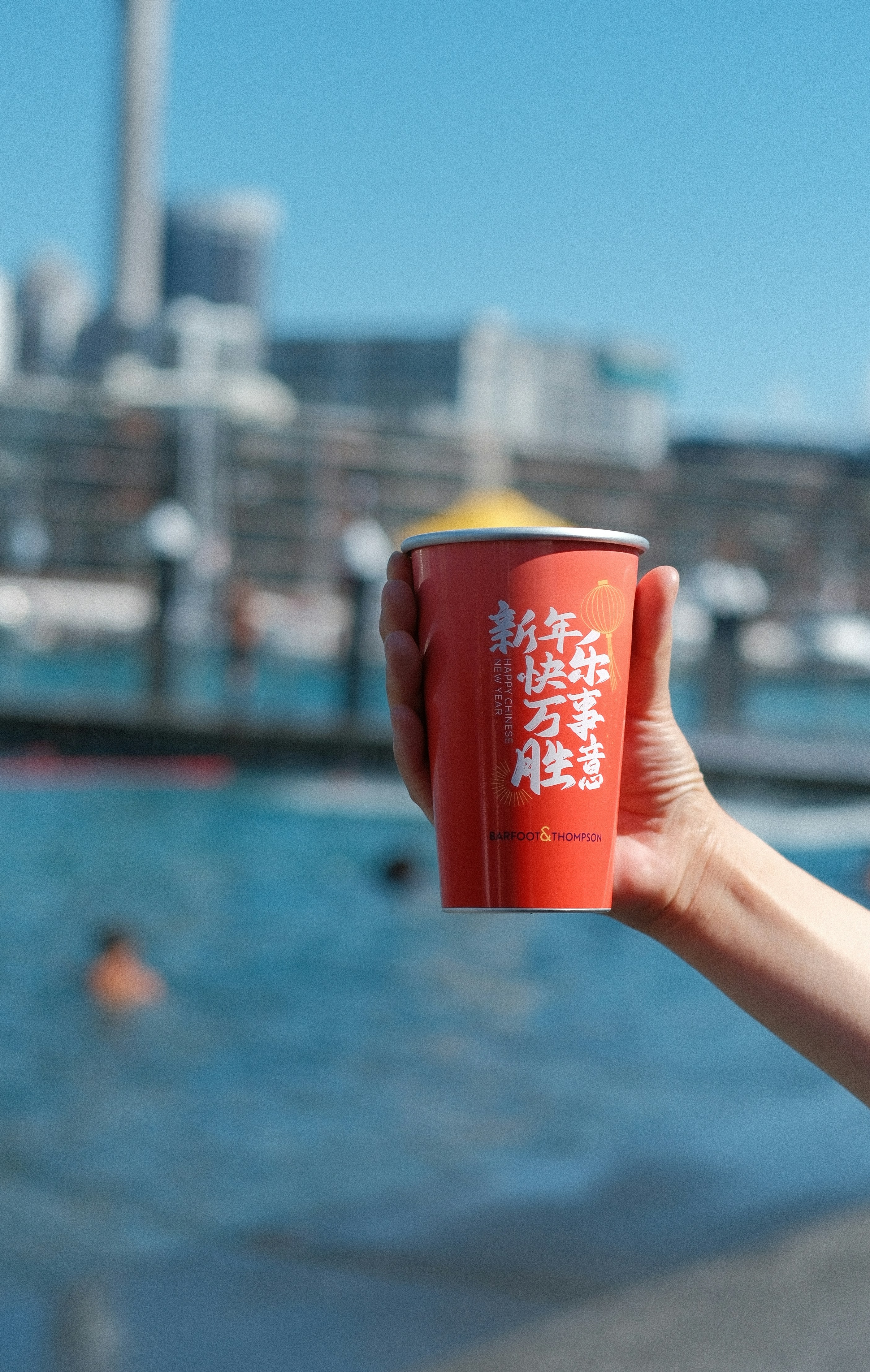 Scarlet Cup of Joy by the Waterfront