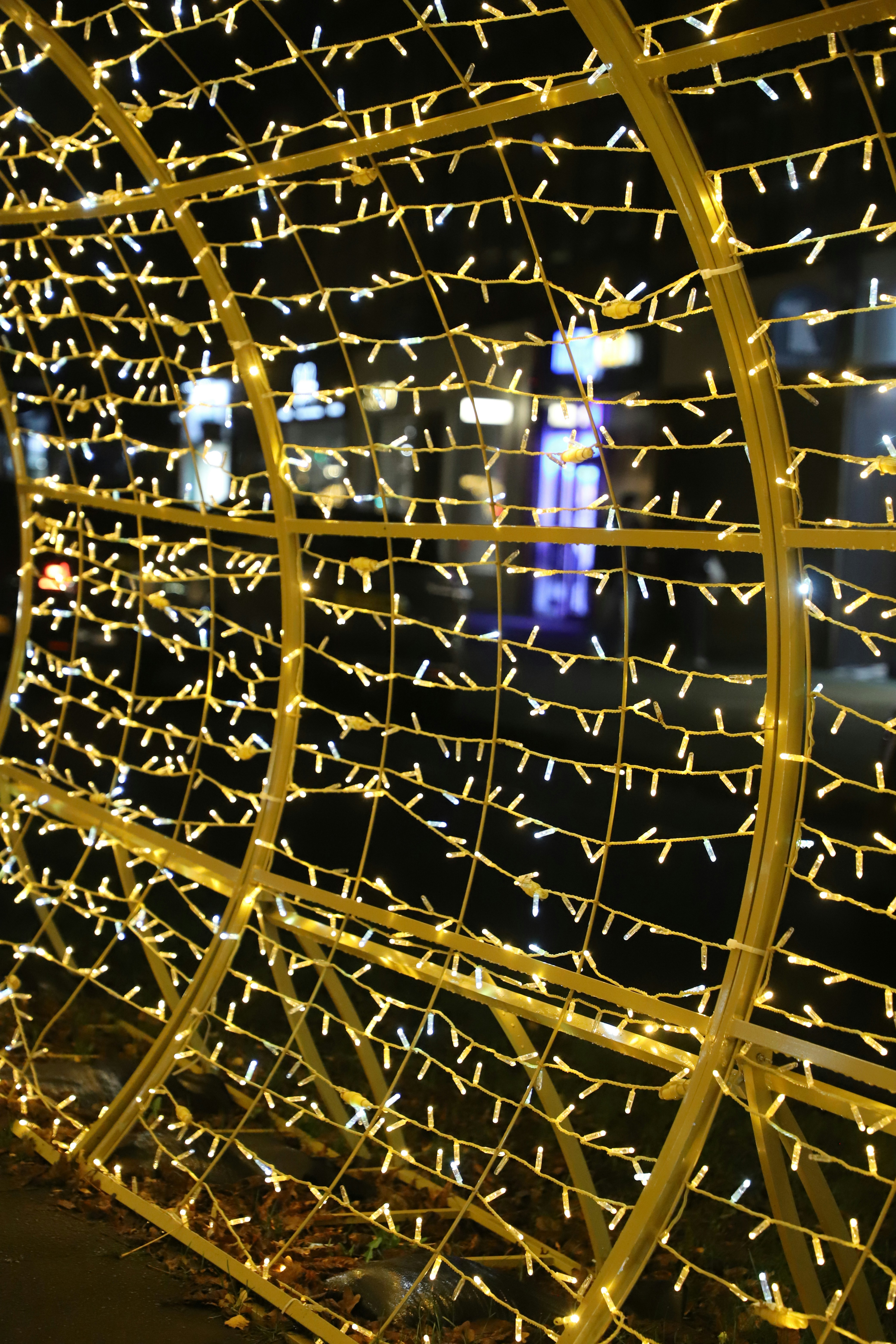Golden Lattice of Lights Framing a Night City Scene