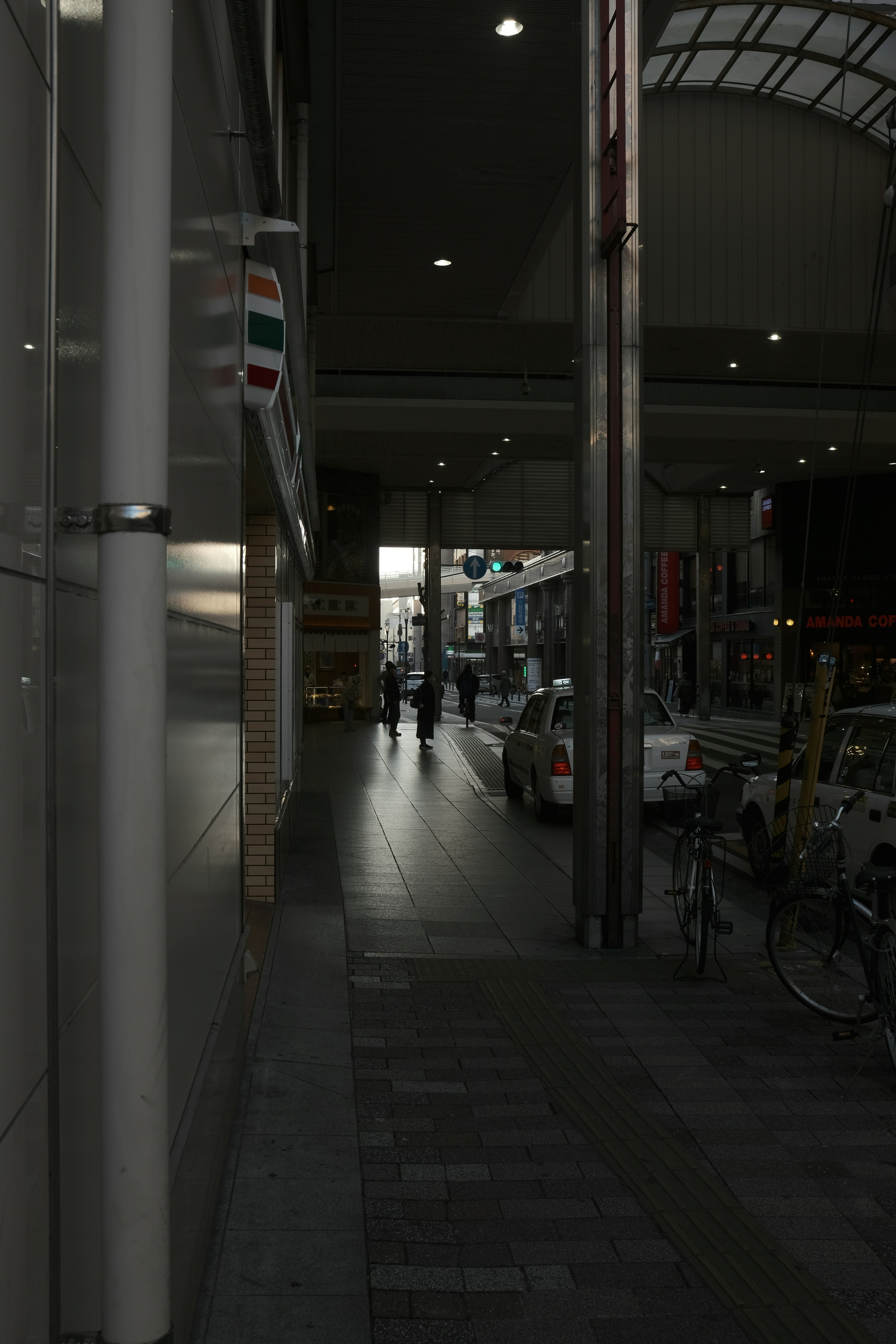 City Corridor at Dusk: Silent Pedestrians and Silent Cars