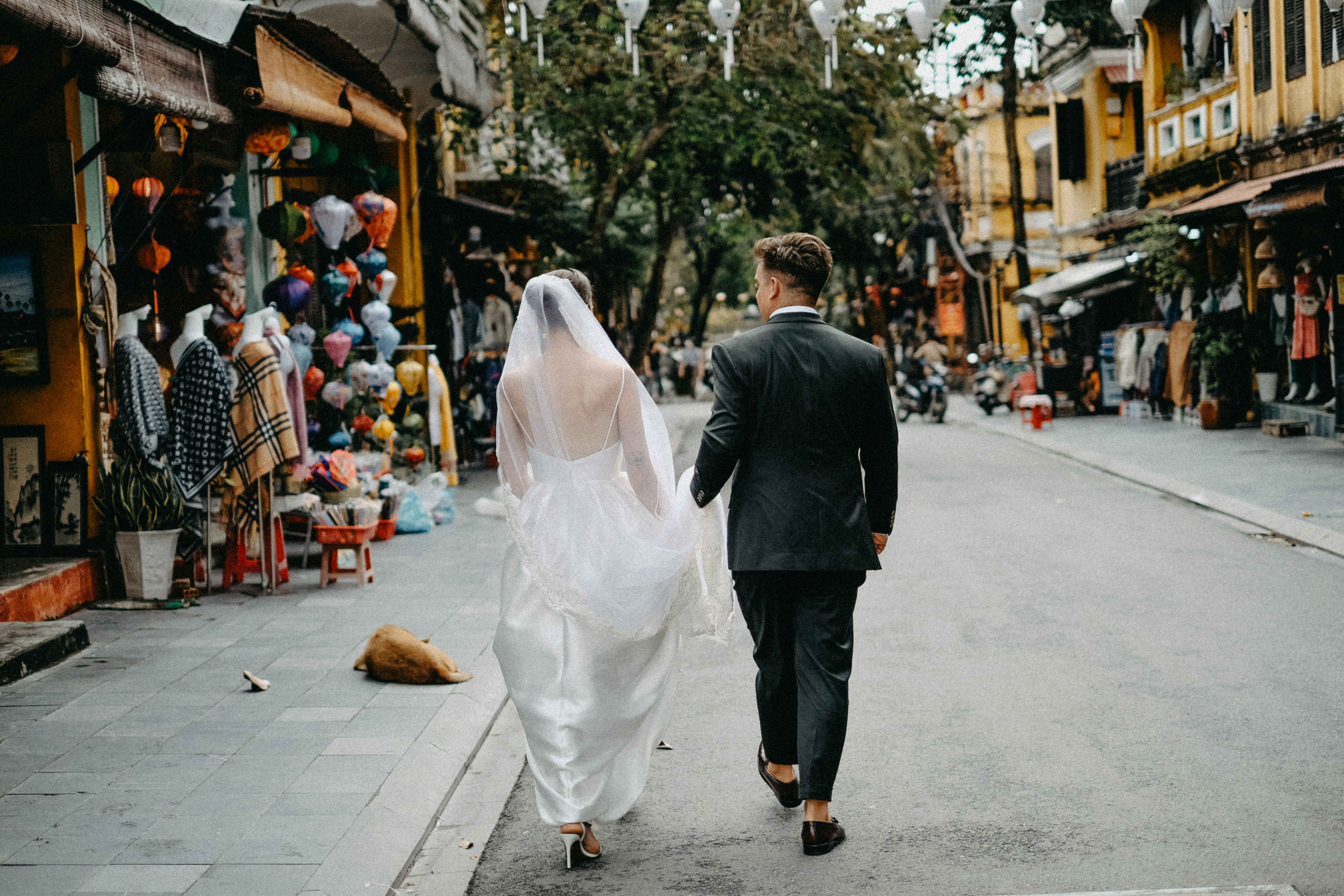 A Walk Through Colorful Streets: Bride and Groom in a Quiet City