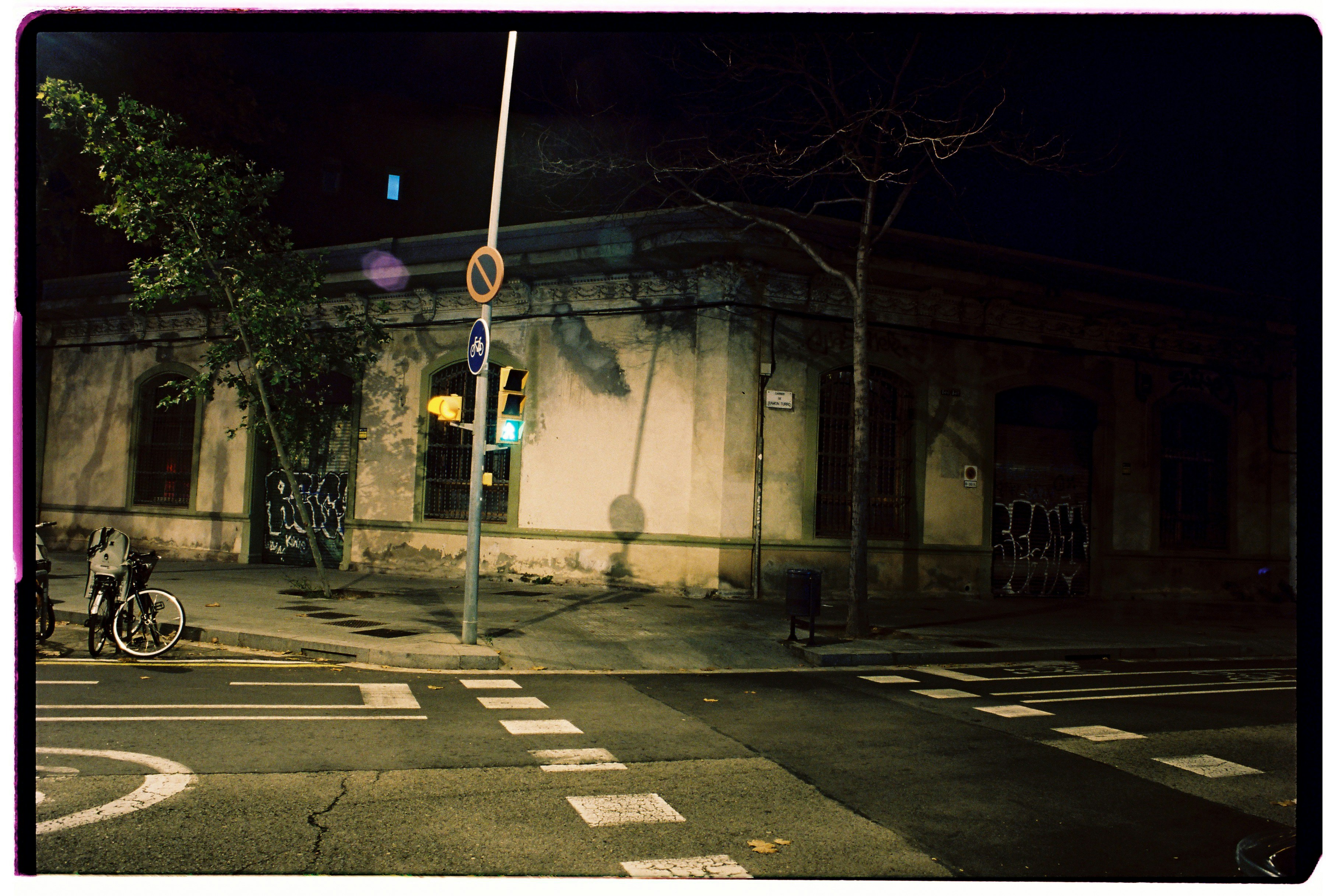 Night Crosswalk Silence Near the Quiet Facade