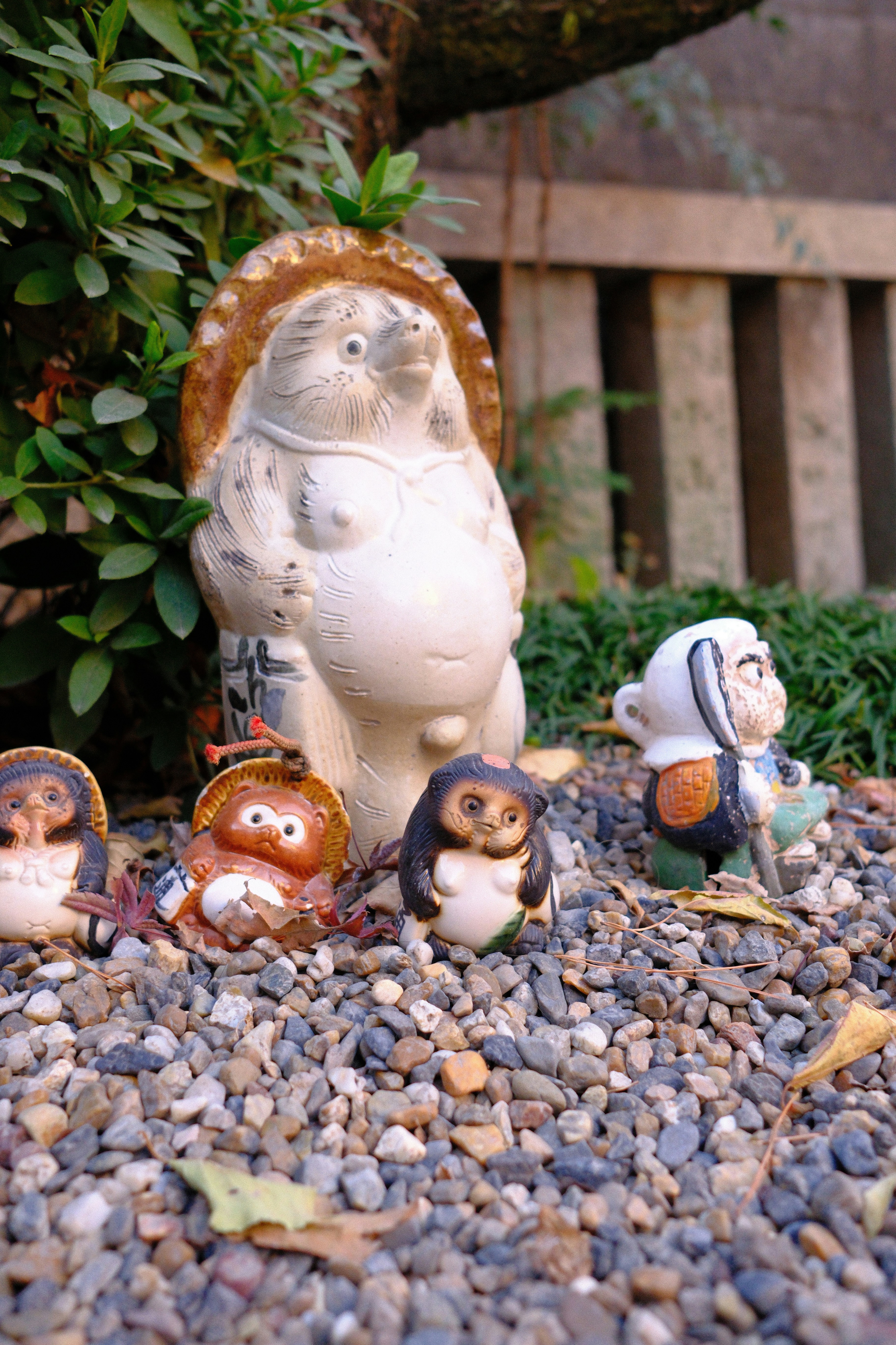 Tiny Guardians of the Gravel: A trio of Smoky Apes and a Budding Buddha
