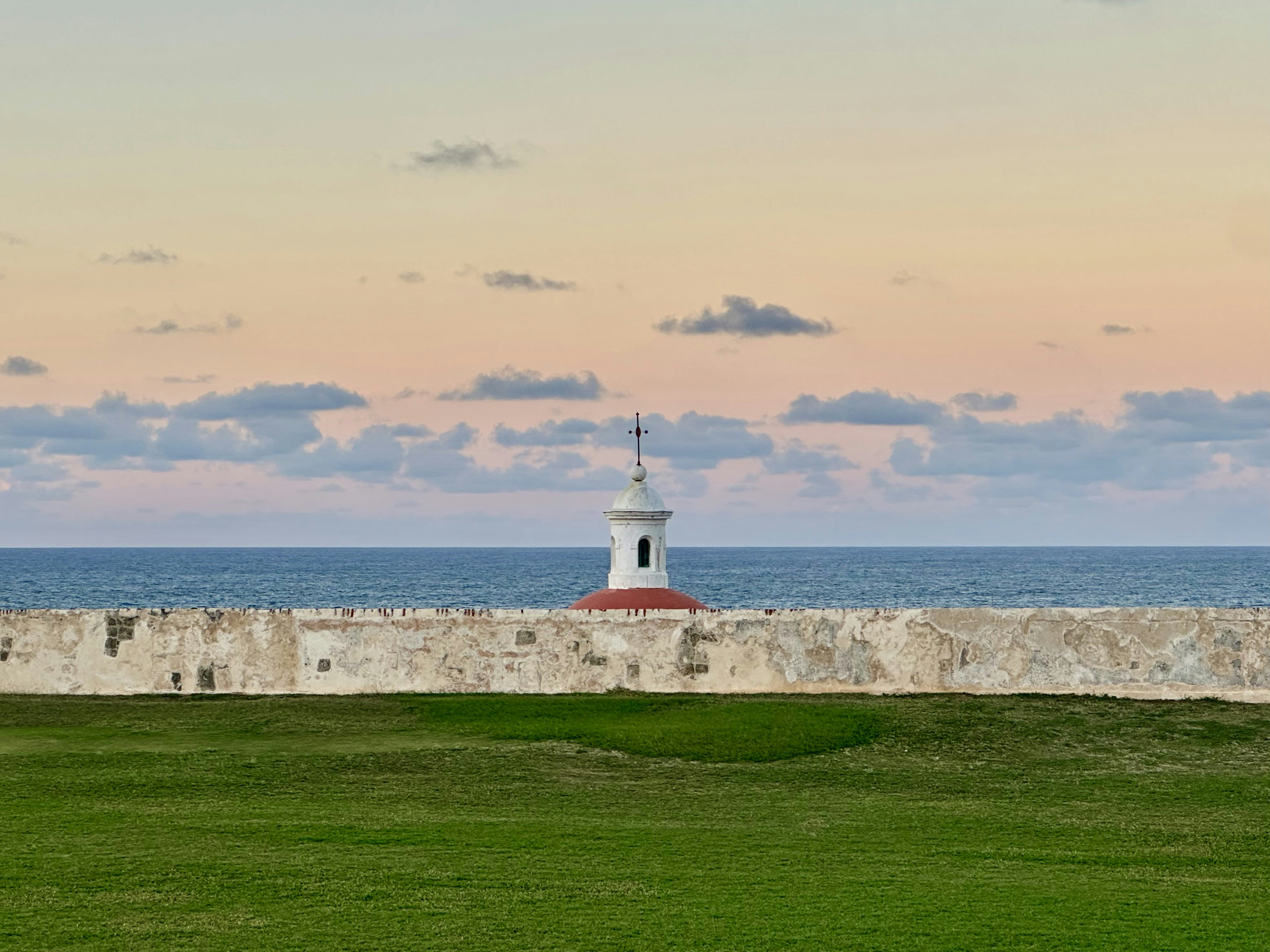 Lighthouse Crest Over a Calm Sea