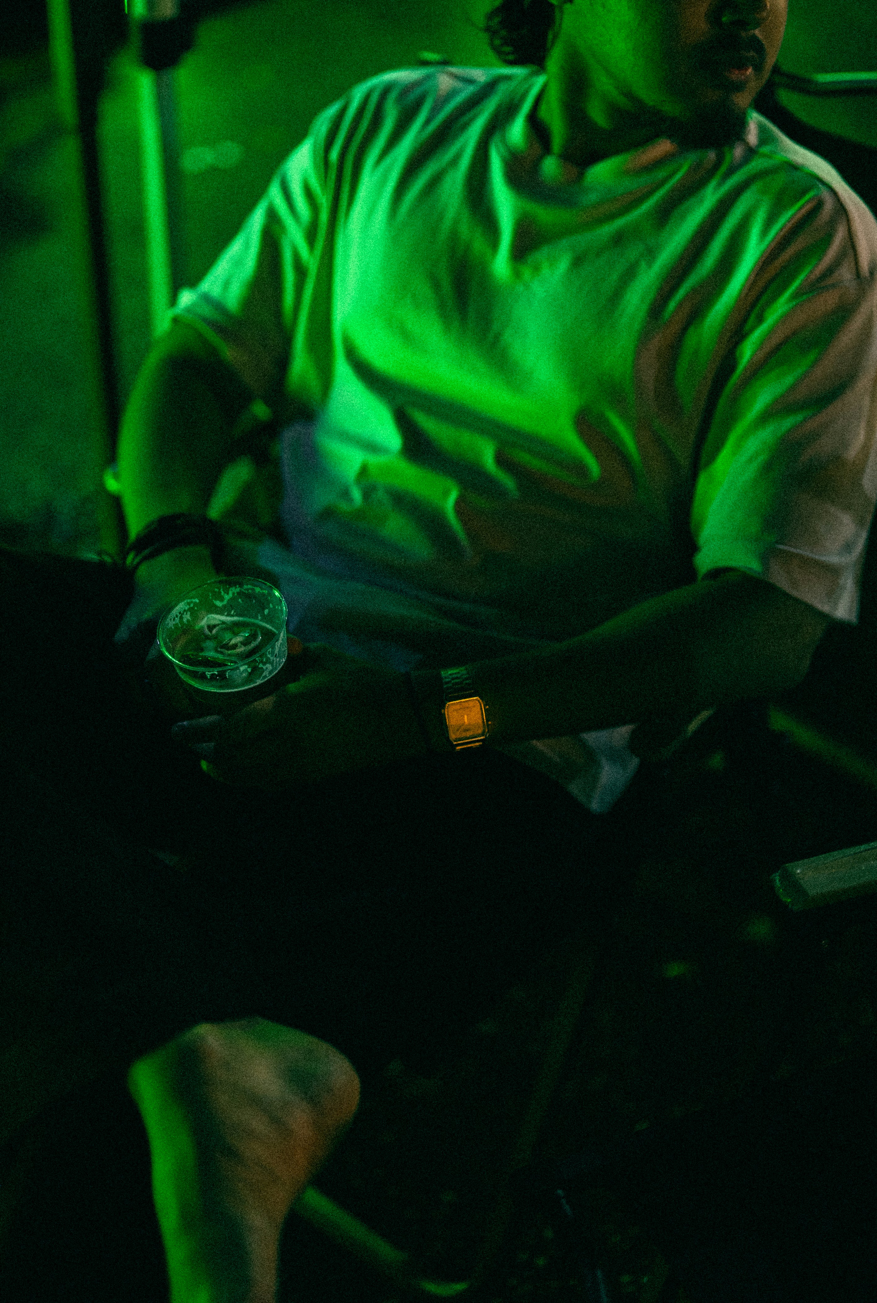 Neon-green Lounge: A Quiet Moment with a Wristwatch