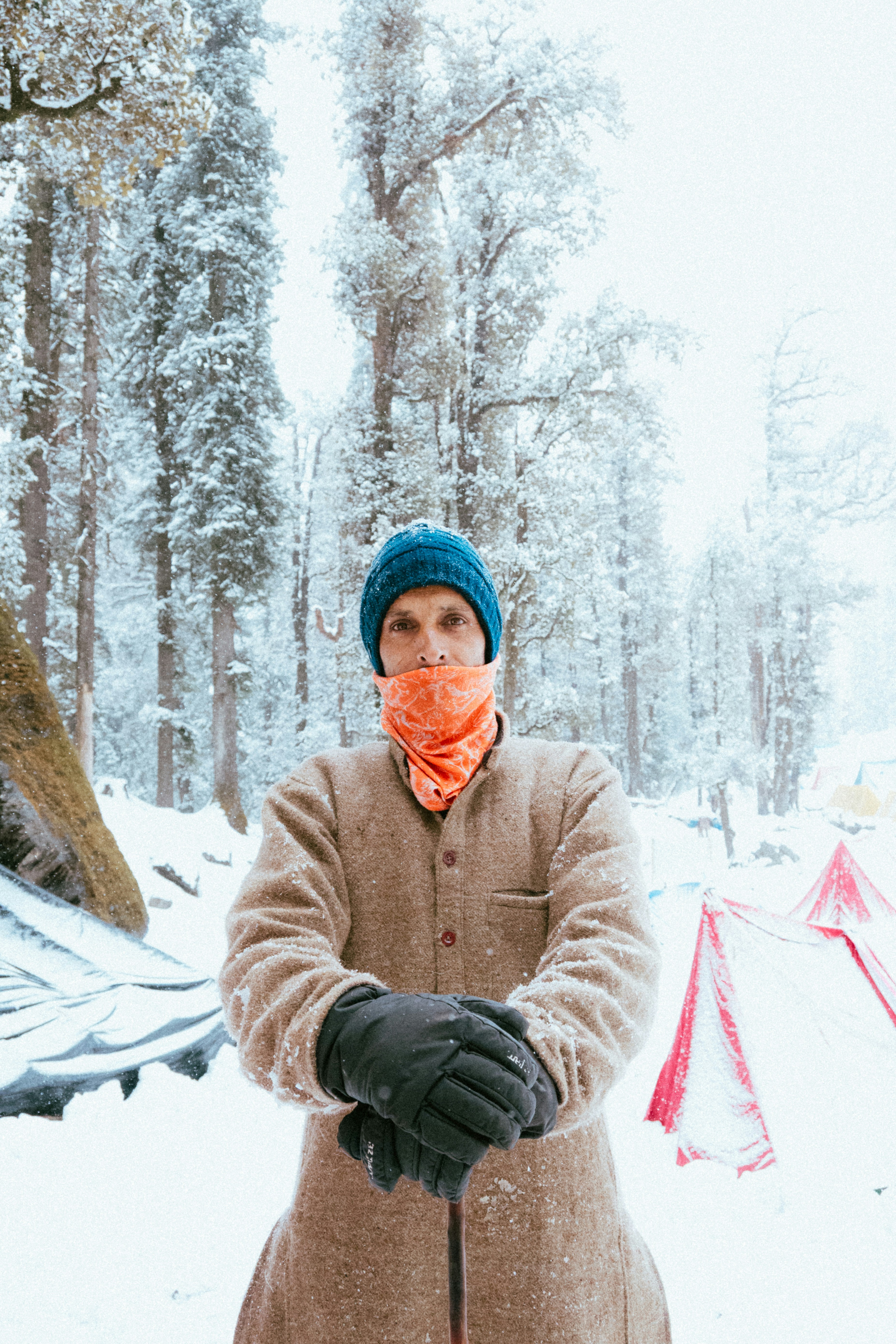 Snowbound Portrait: Focused Gaze Amid a Winter Camp