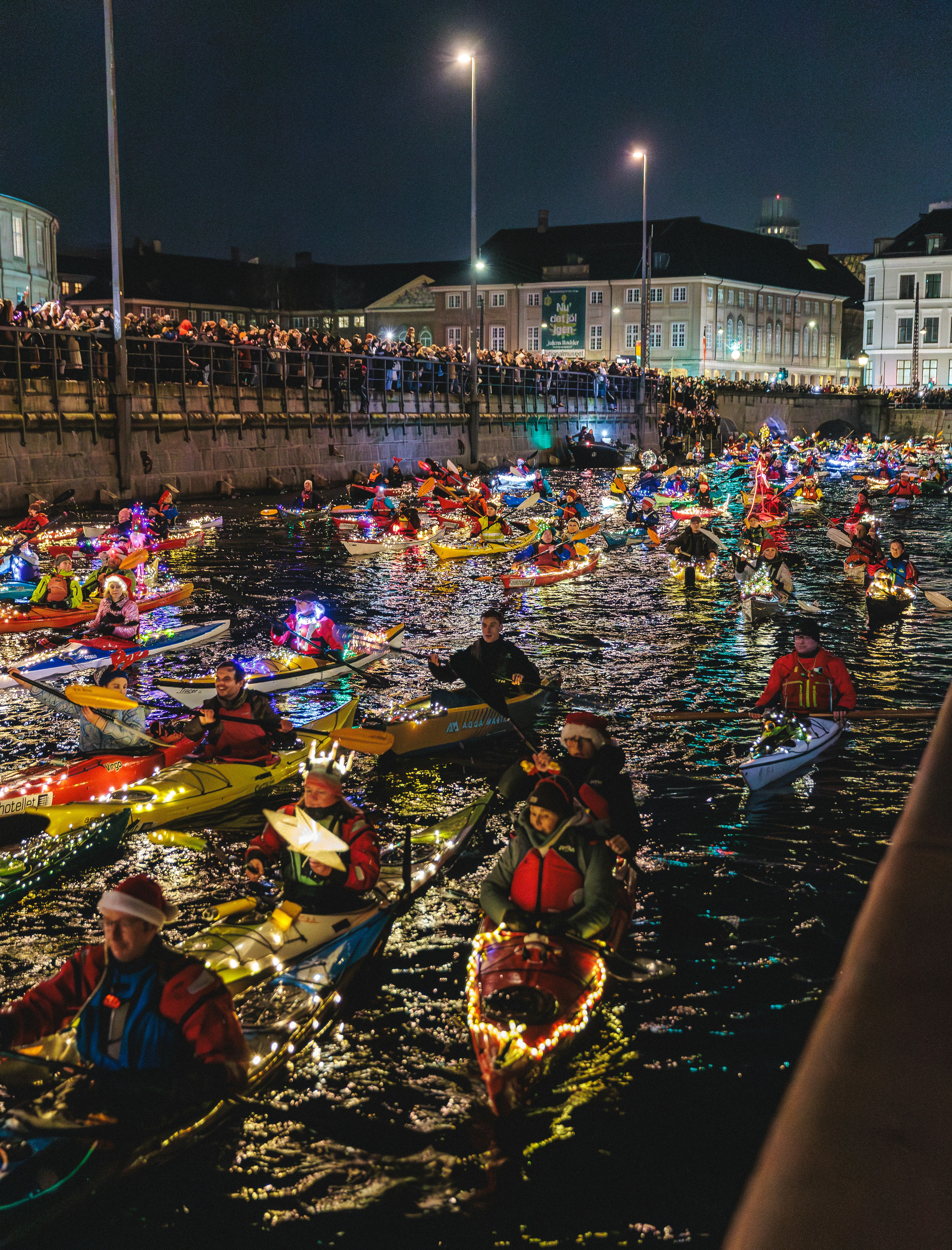 Night Canoe Parade: Colorful Lantern-lit Kayaks Parade Down the River