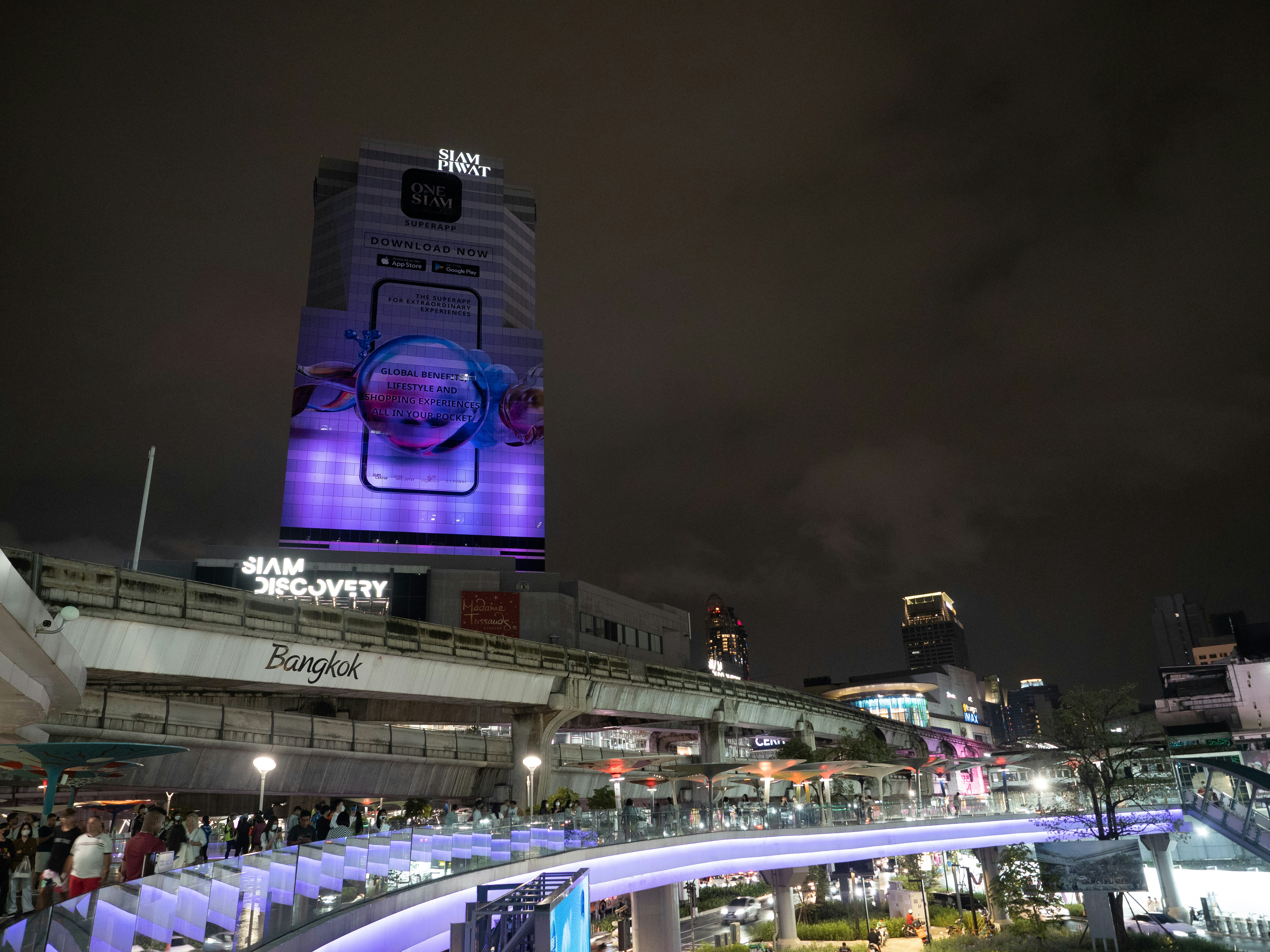 Neon Cascade Over Bangkok Riverwalk