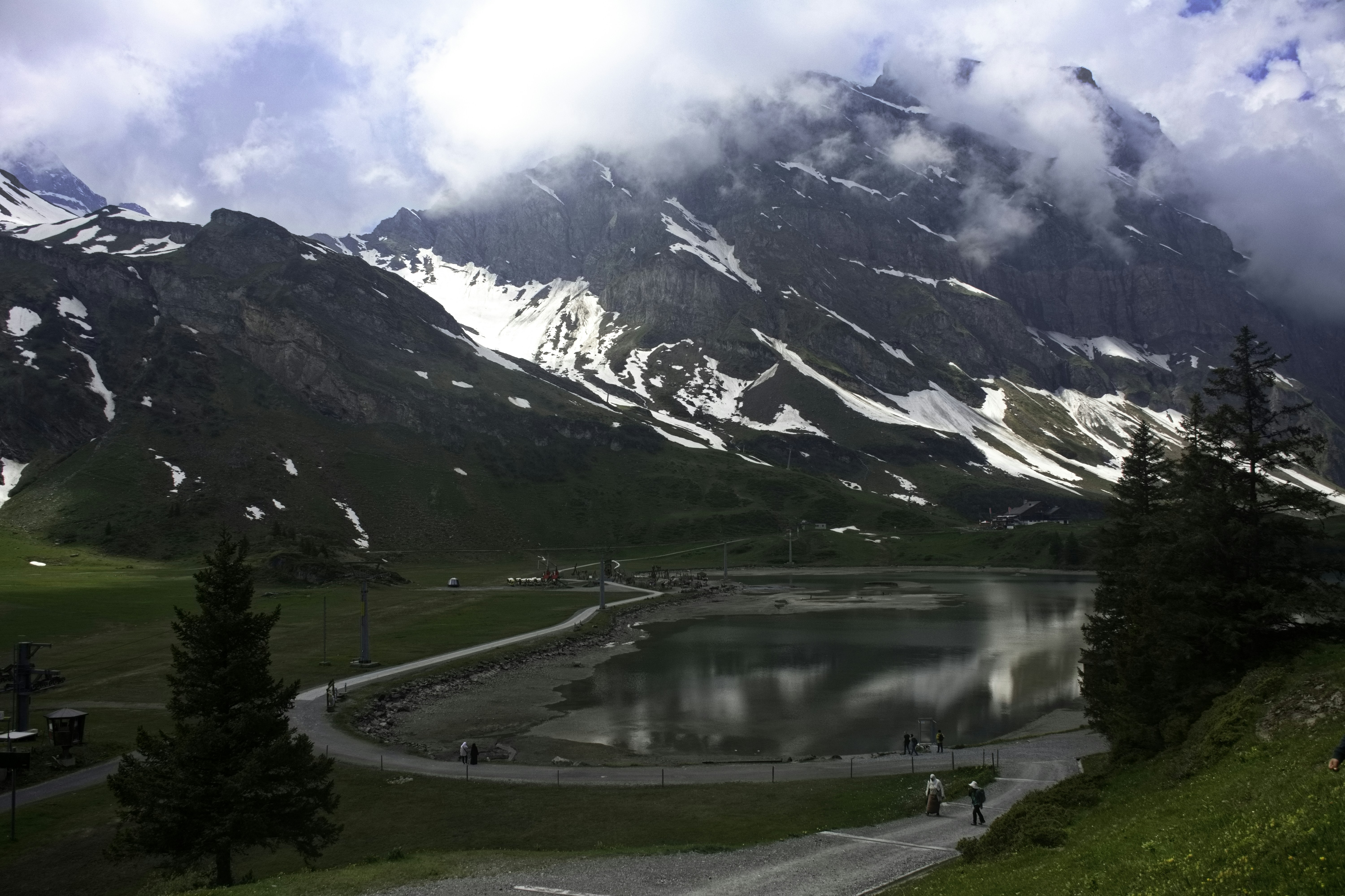 Alpine Terrace beneath the Cloud-Crowned Peaks