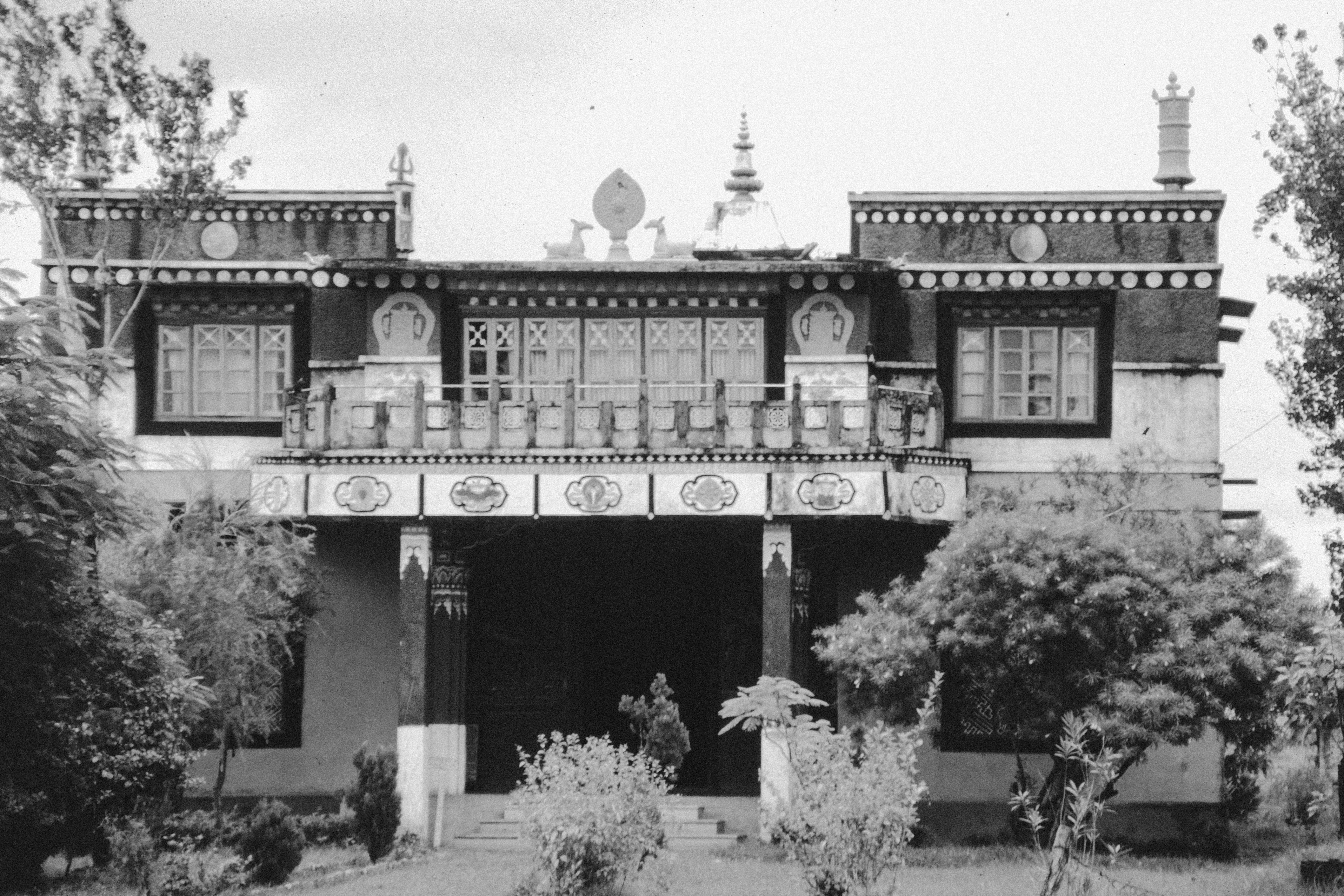 Front Facade of a Traditional Tibetan-Inspired Building with Ornate Balustrade