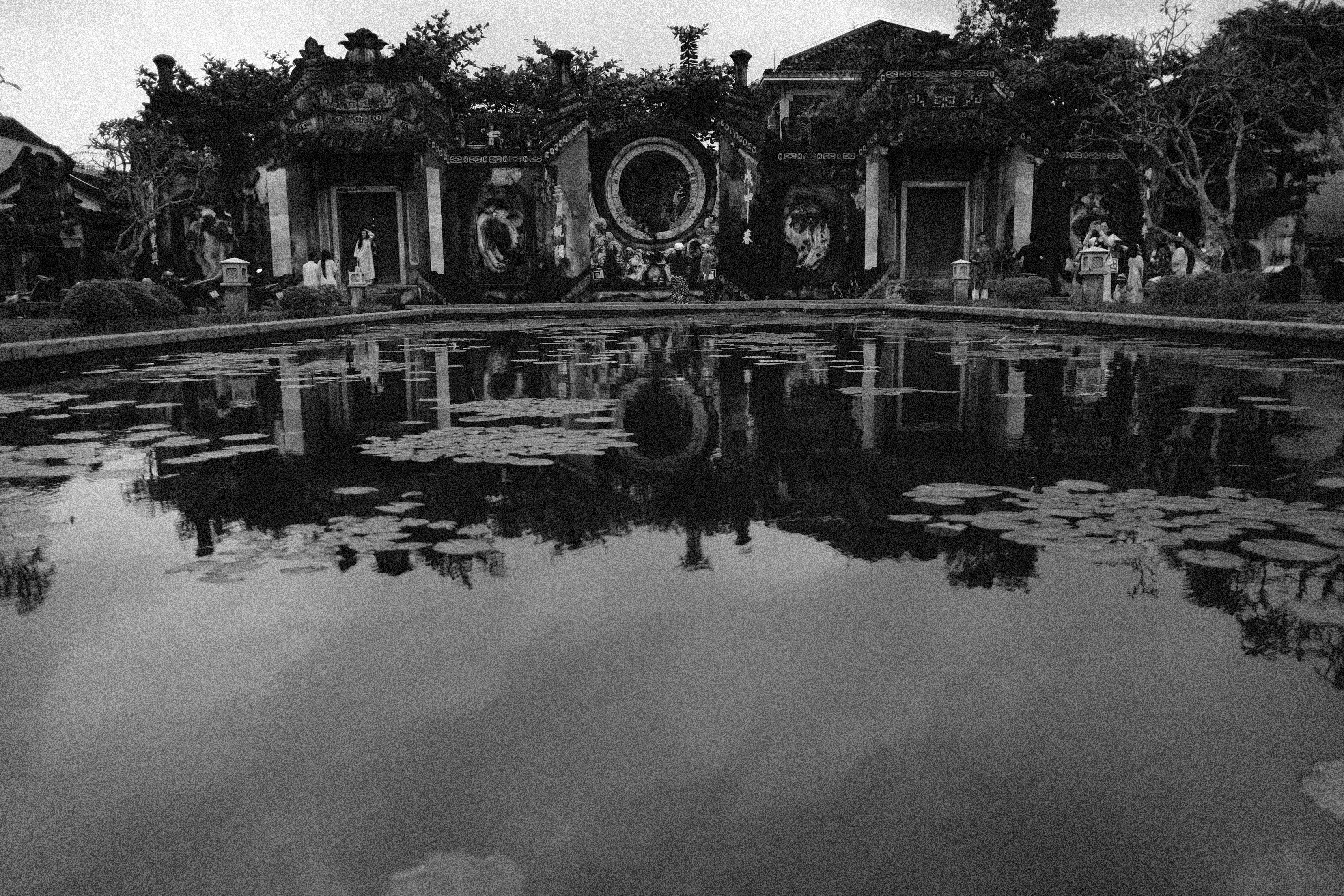 Serene Waterfront Temple Reflections