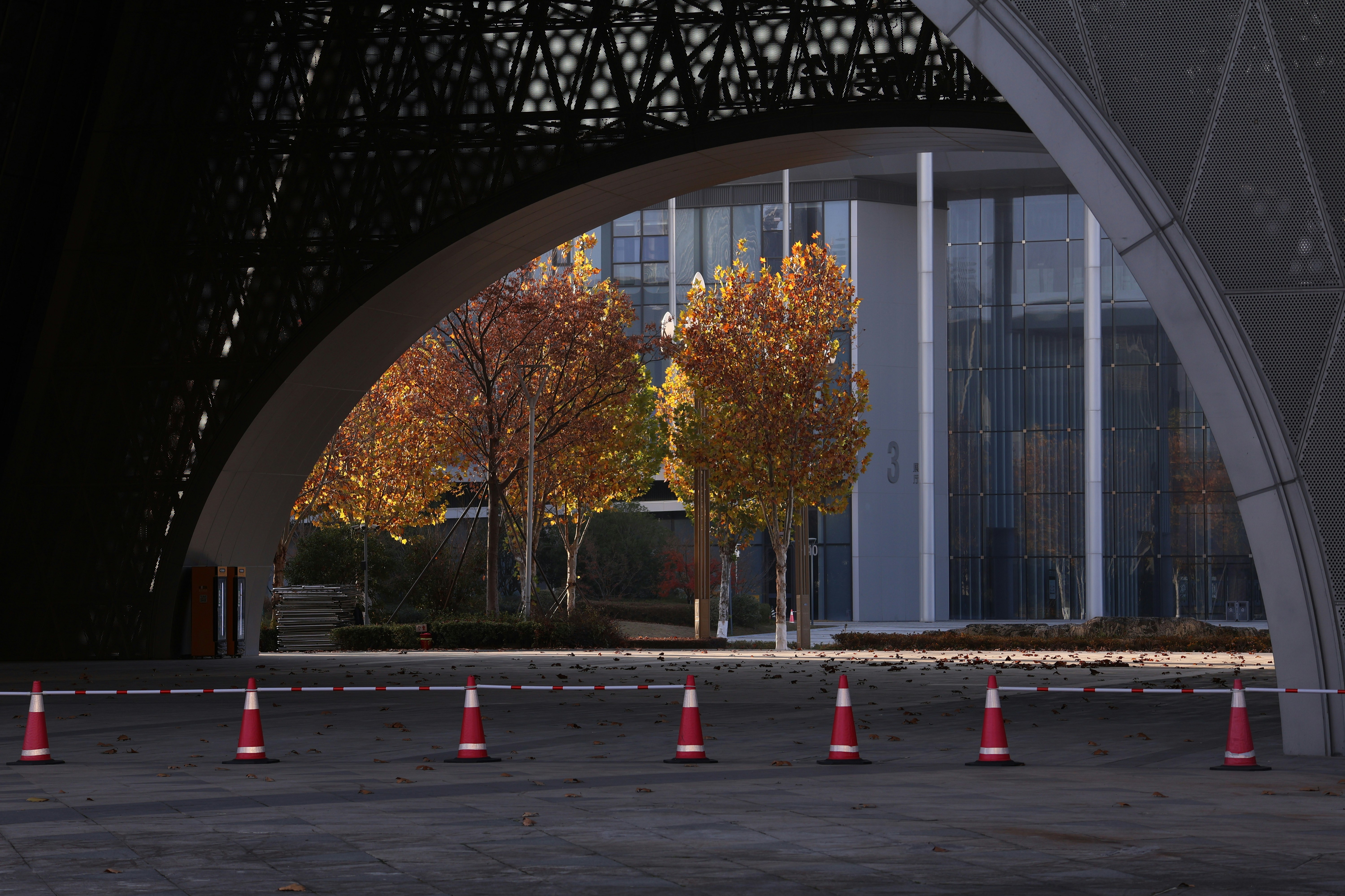 Autumn Alley Framed by Archway