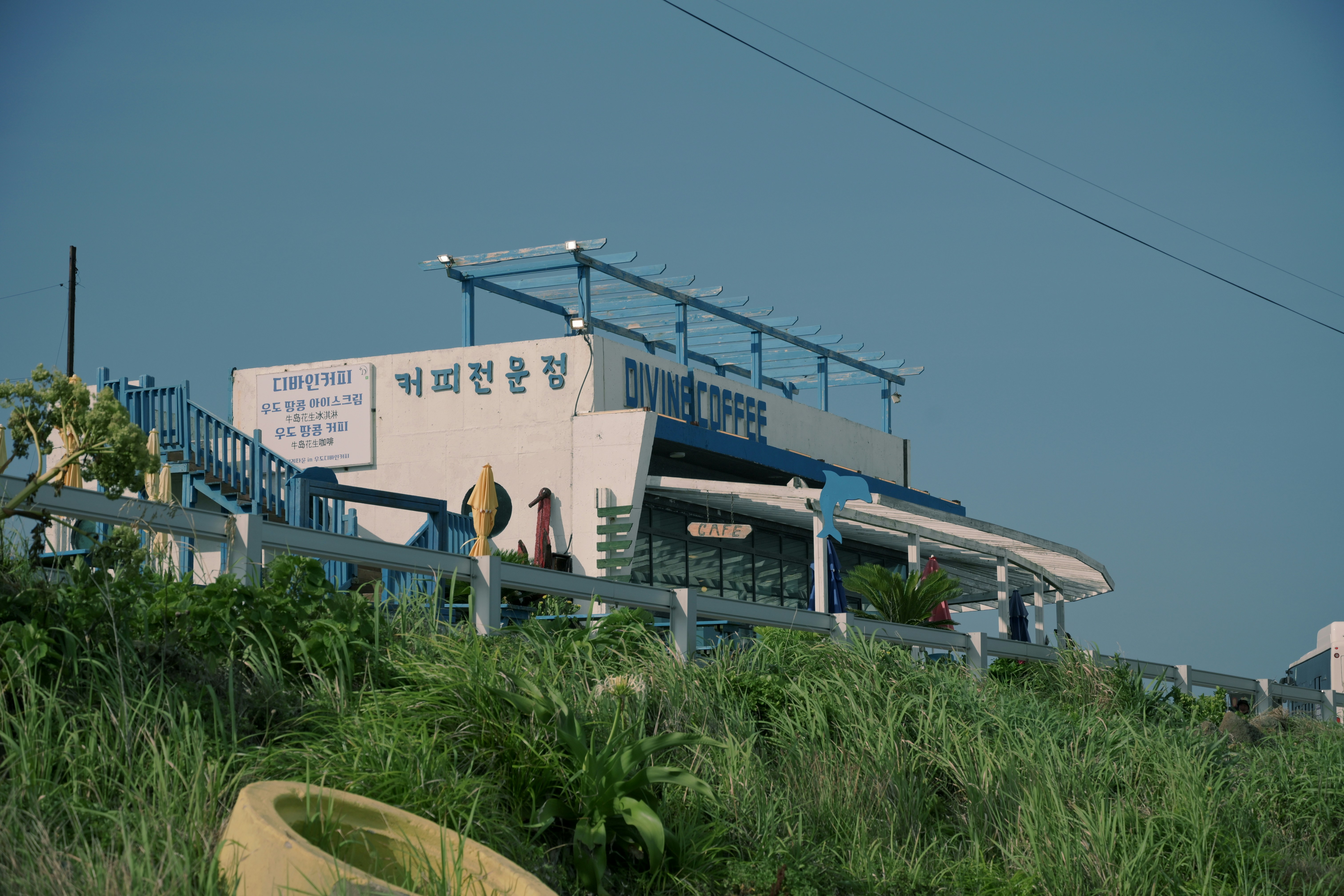 Surfside Café Signage Above the Coastal Cliff