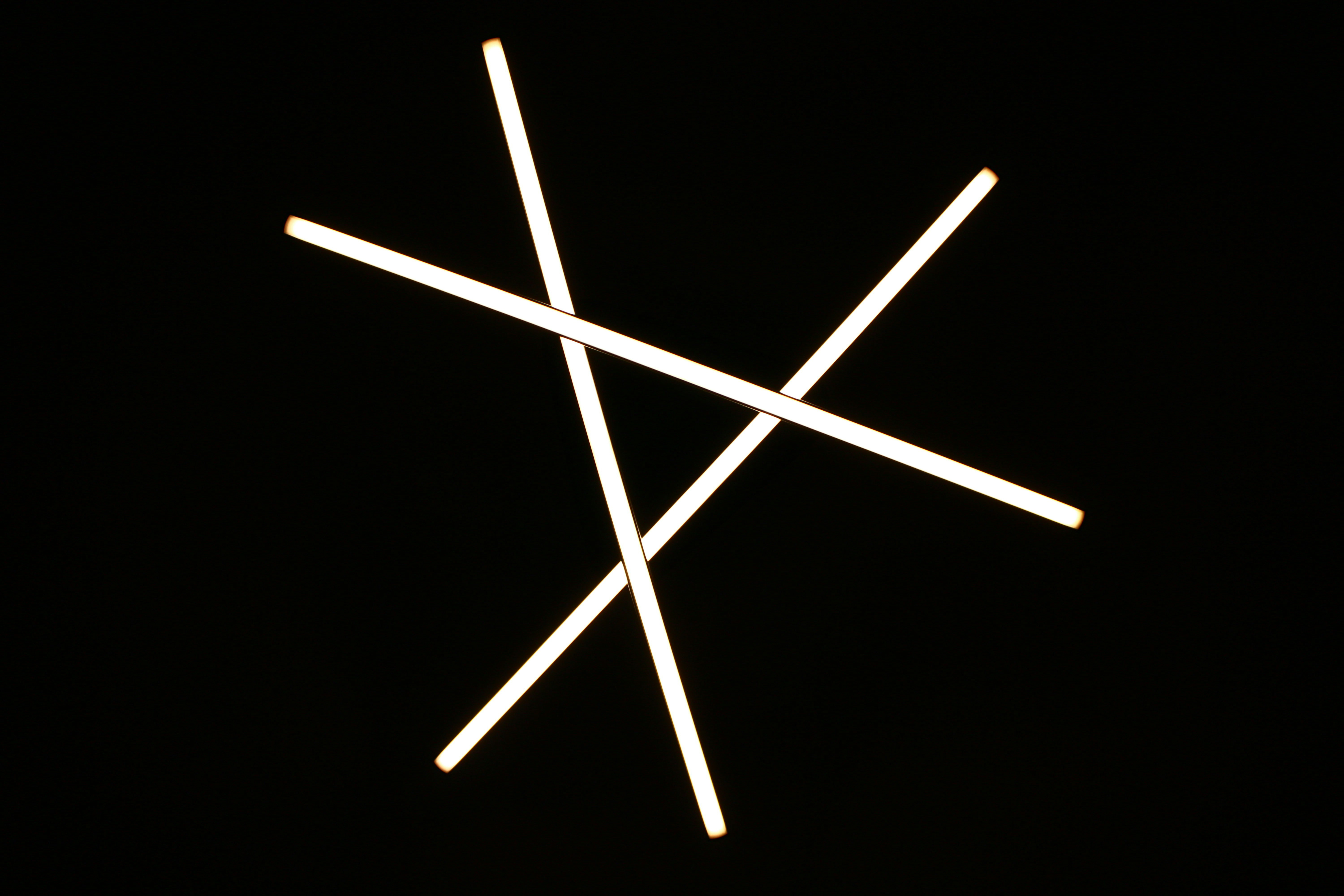 Intersecting Neon Lines in Night Quiet