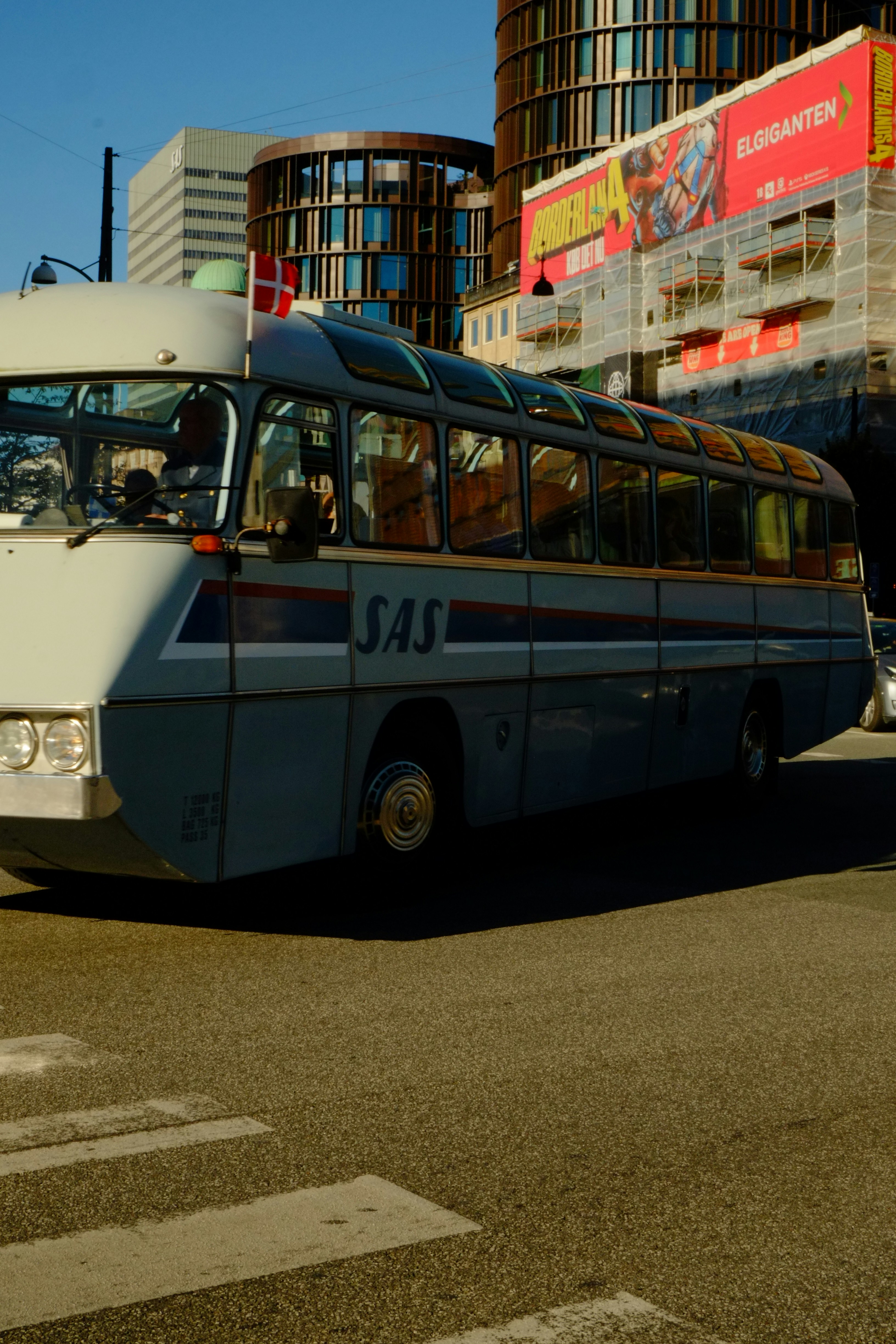 SAS Bus in the City Grayscale: A Glimpse of Urban Motion