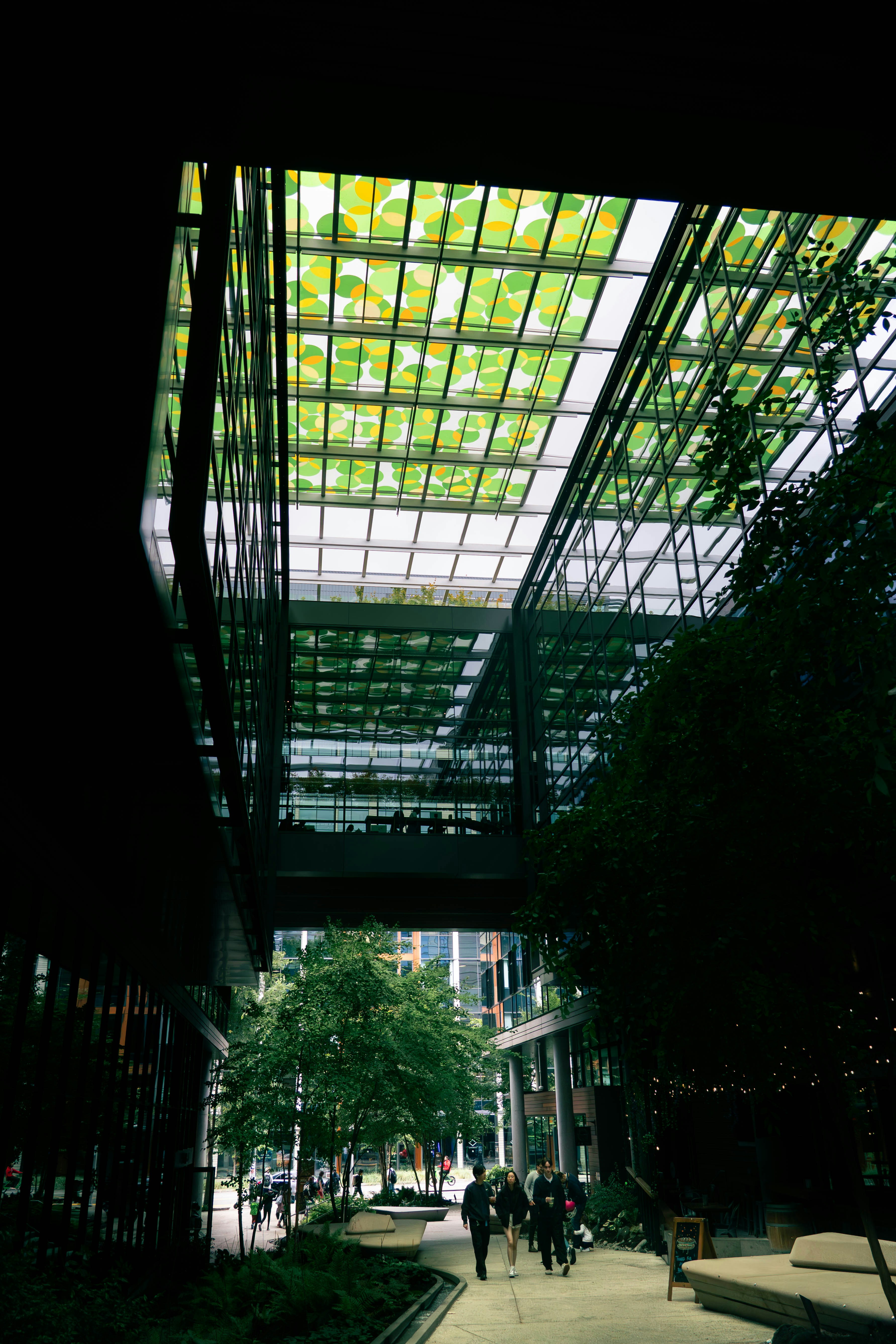 Glass Corridor Overpass: City Garden into the Crowd