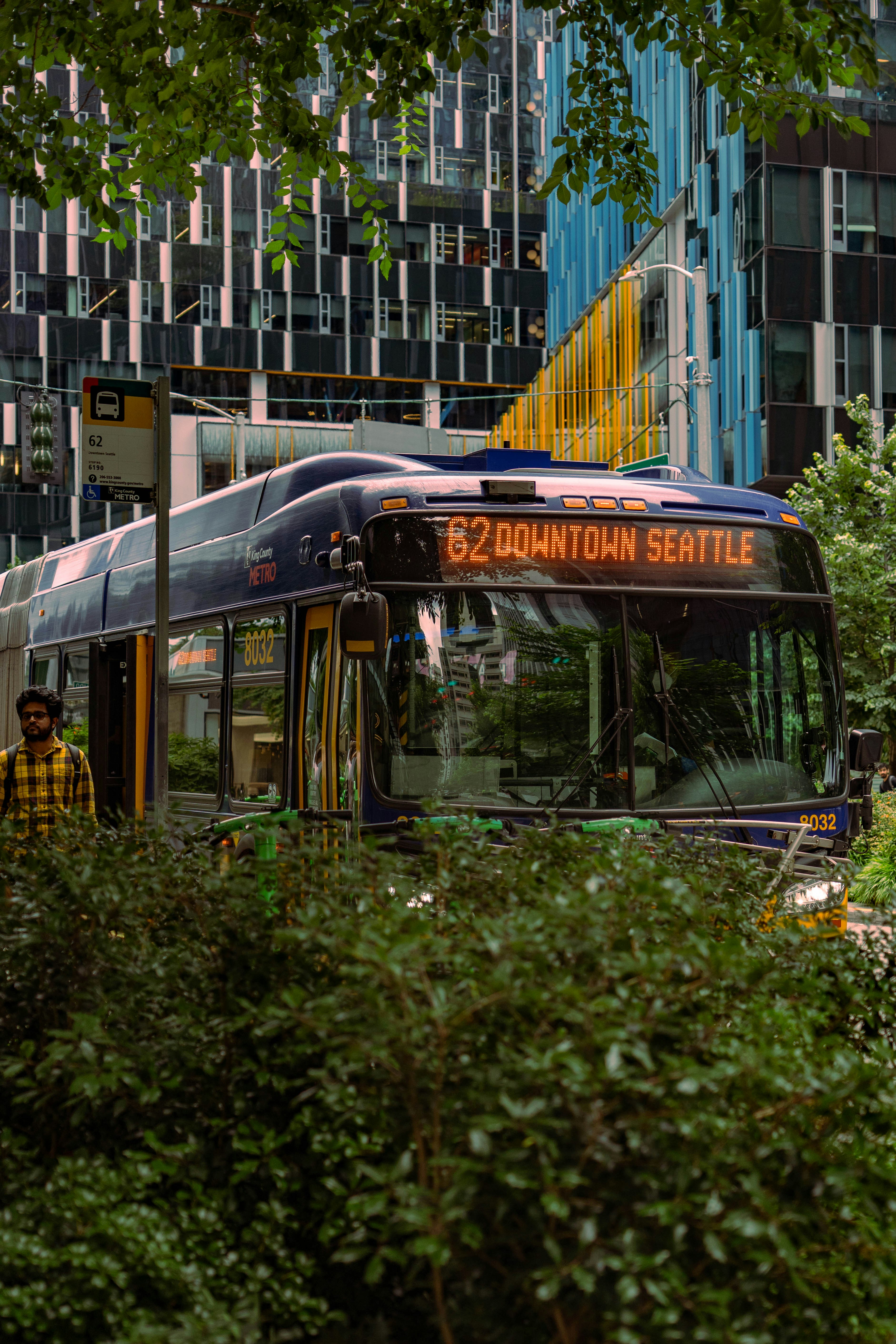 Downtown Pulse: A Seattle Streetcar Slaloms Through Glass and Green