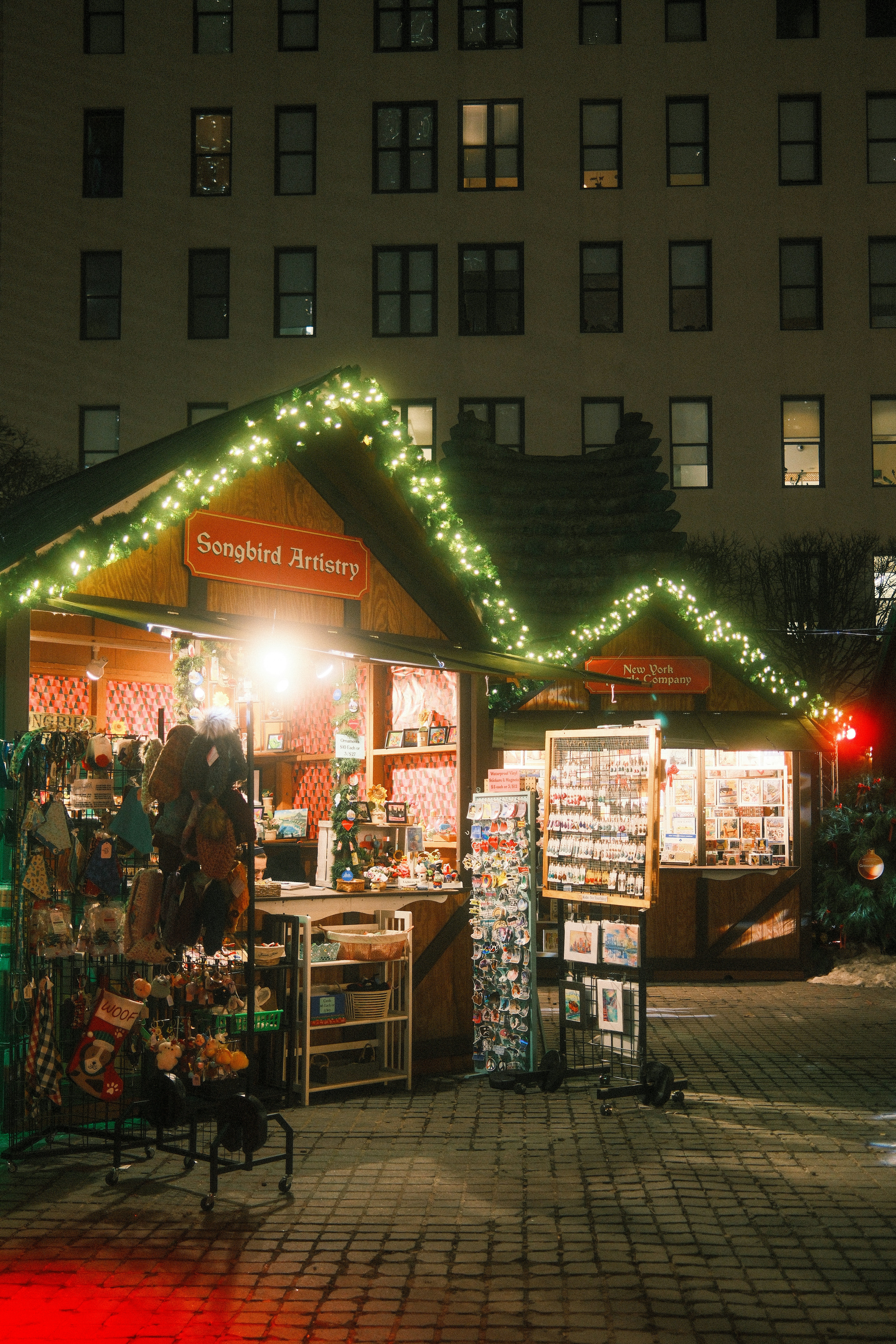 Christmas market stall decorated with lights at night photo – Free ...