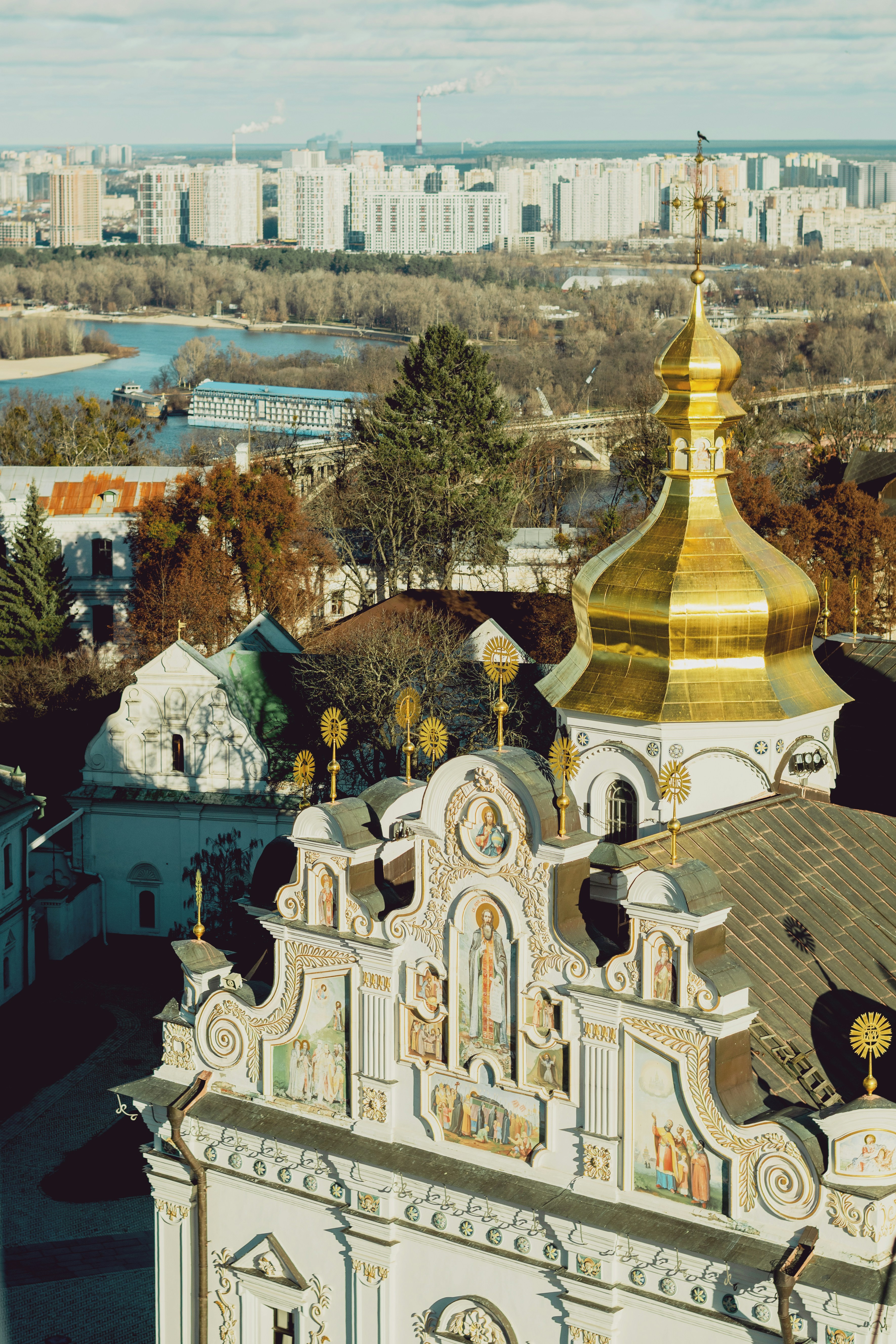 Golden Dome over a Cathedral: Cityscape Beyond the Church Courtyard