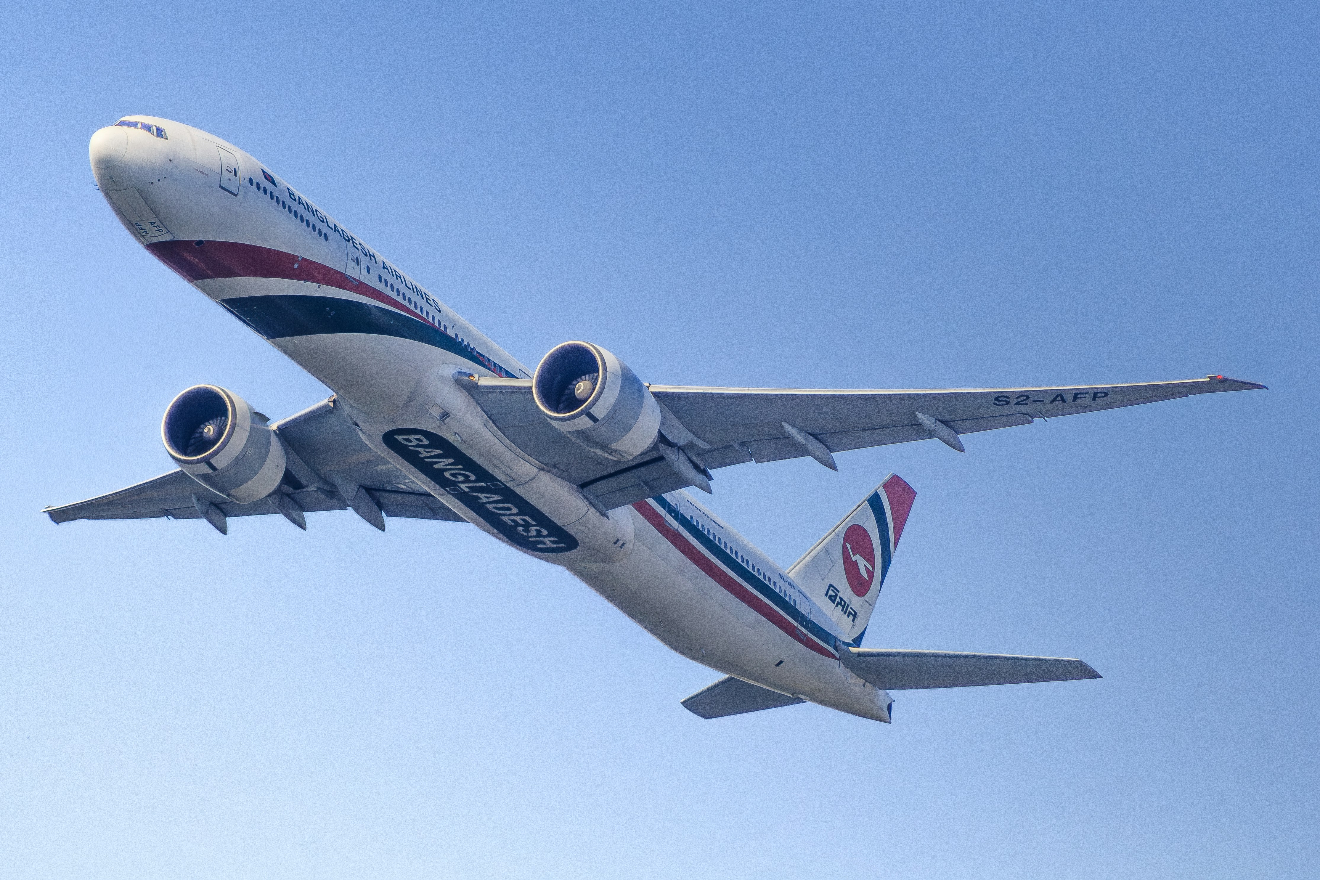 Blue Skyliner: A Boeing in Flight Above the Freeway of Clouds