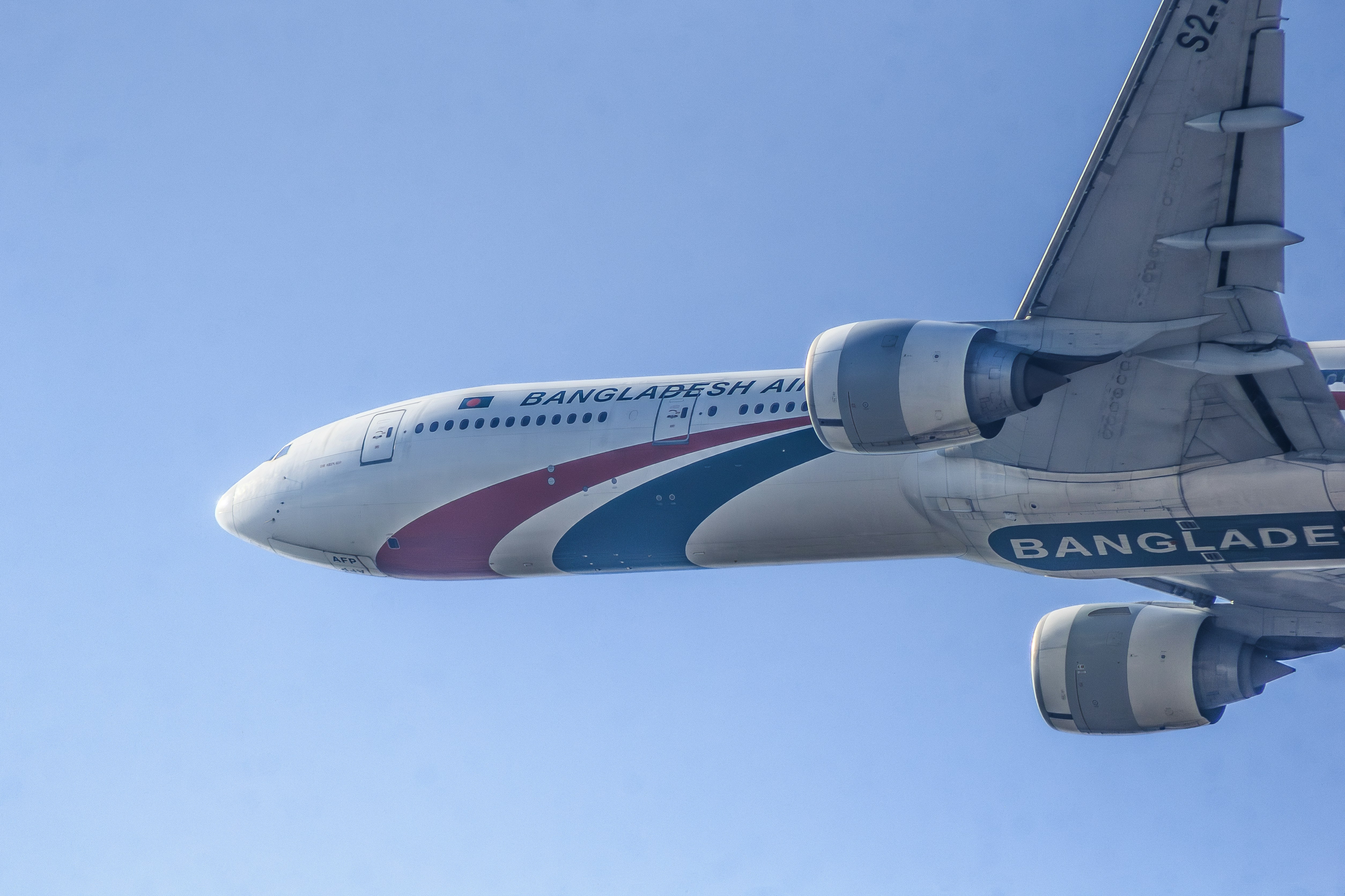 Bangladesh Airlines Aerial inboard: nose and logo in the blue sky