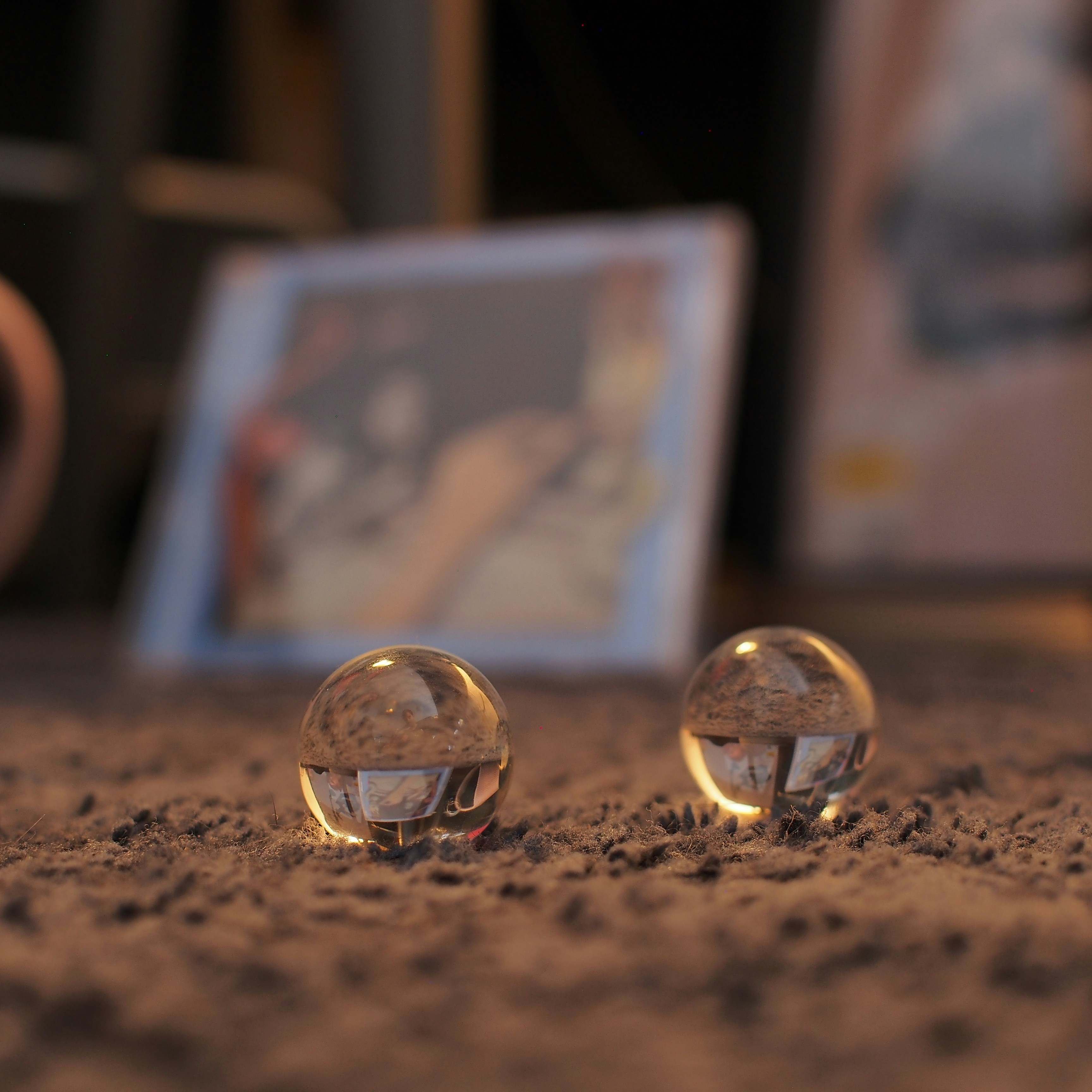 Glass Orbs in Focus: Ground-level Detail with a Framed Blur