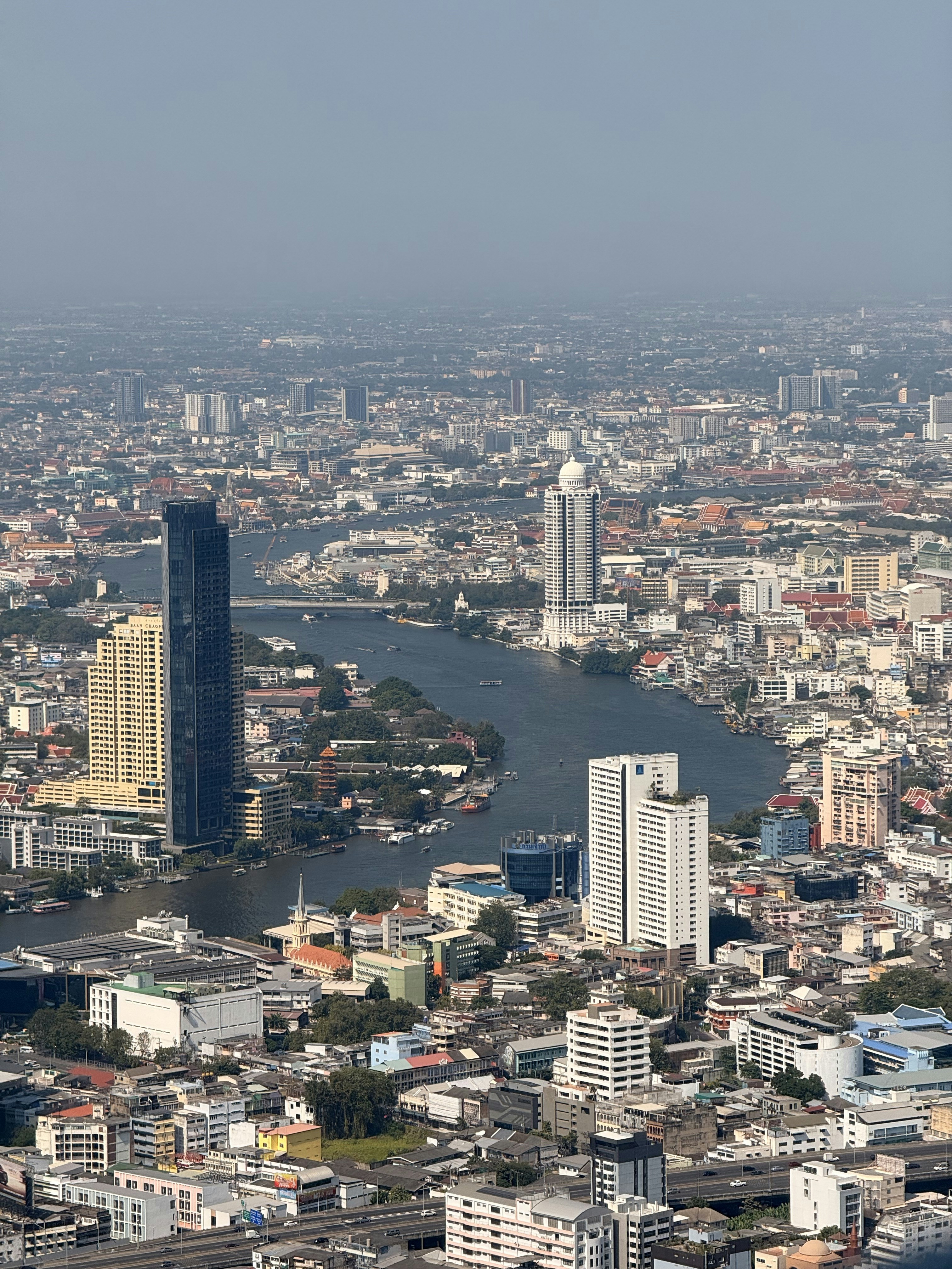 River Bend Skyscraper City: Aerial Portrait of a Dense Urban Core