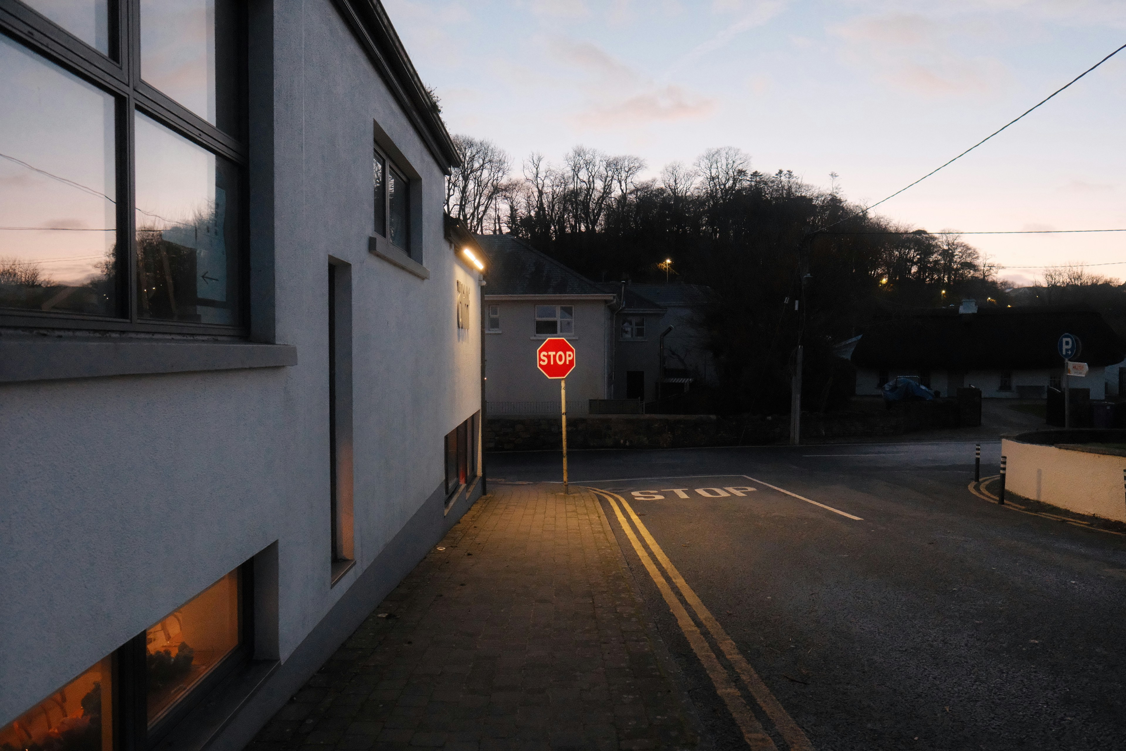 Street Corner with Stop Sign at Dusk