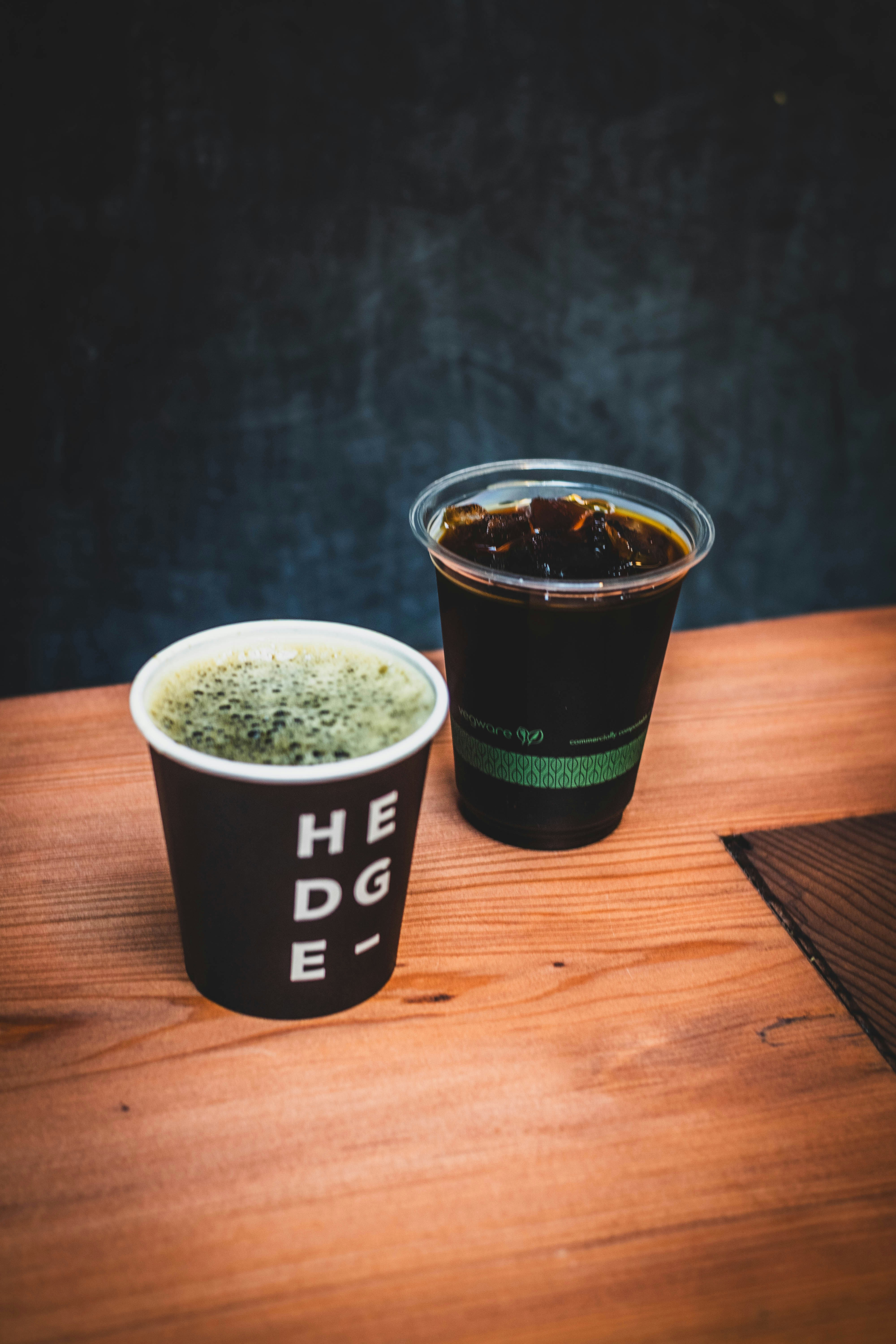 Two Cups, One Table: Coffee Pair on a Wooden Counter