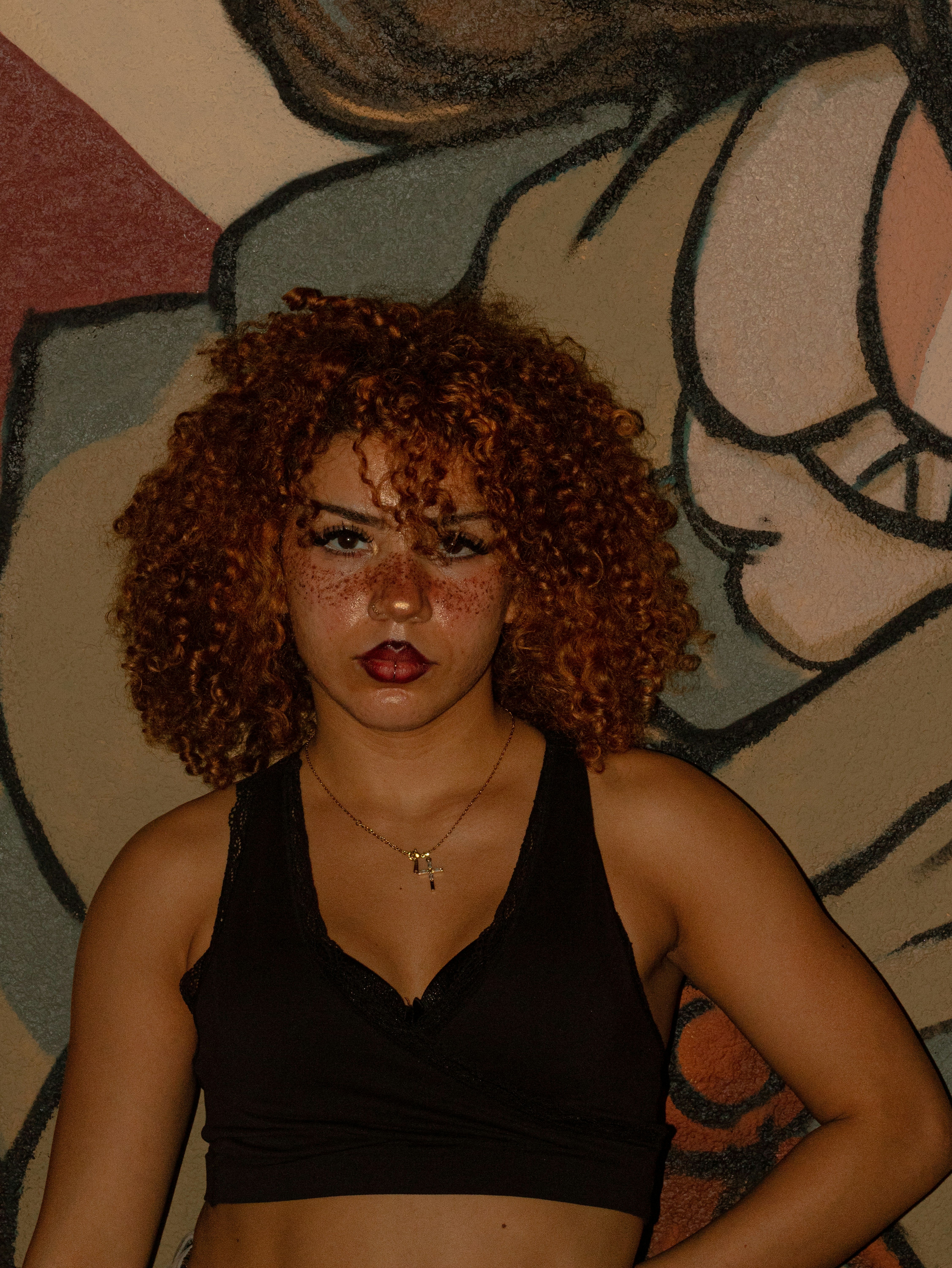 Curly Confidence Under Studio Graffiti