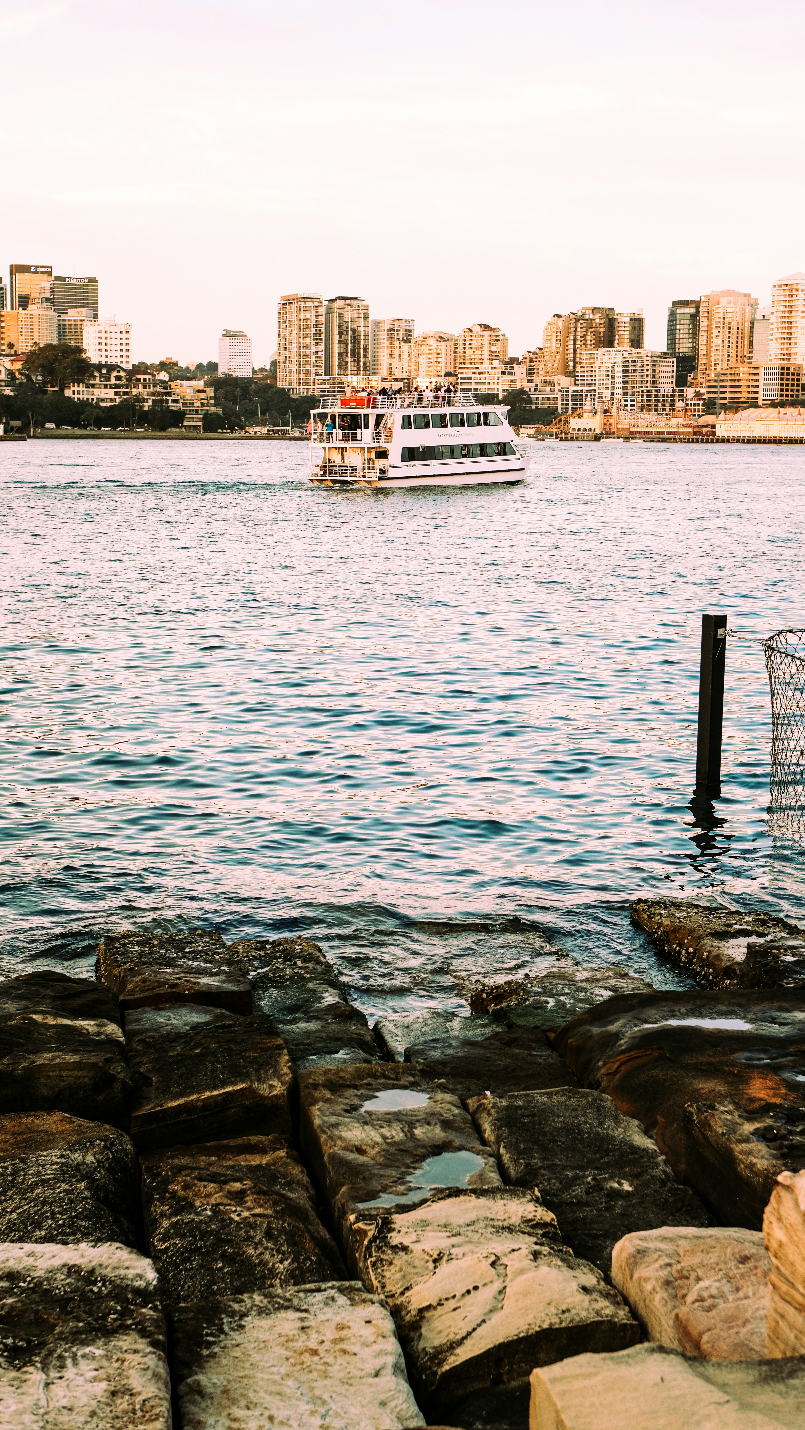 City Ferry Crossing the Calm Waterfront