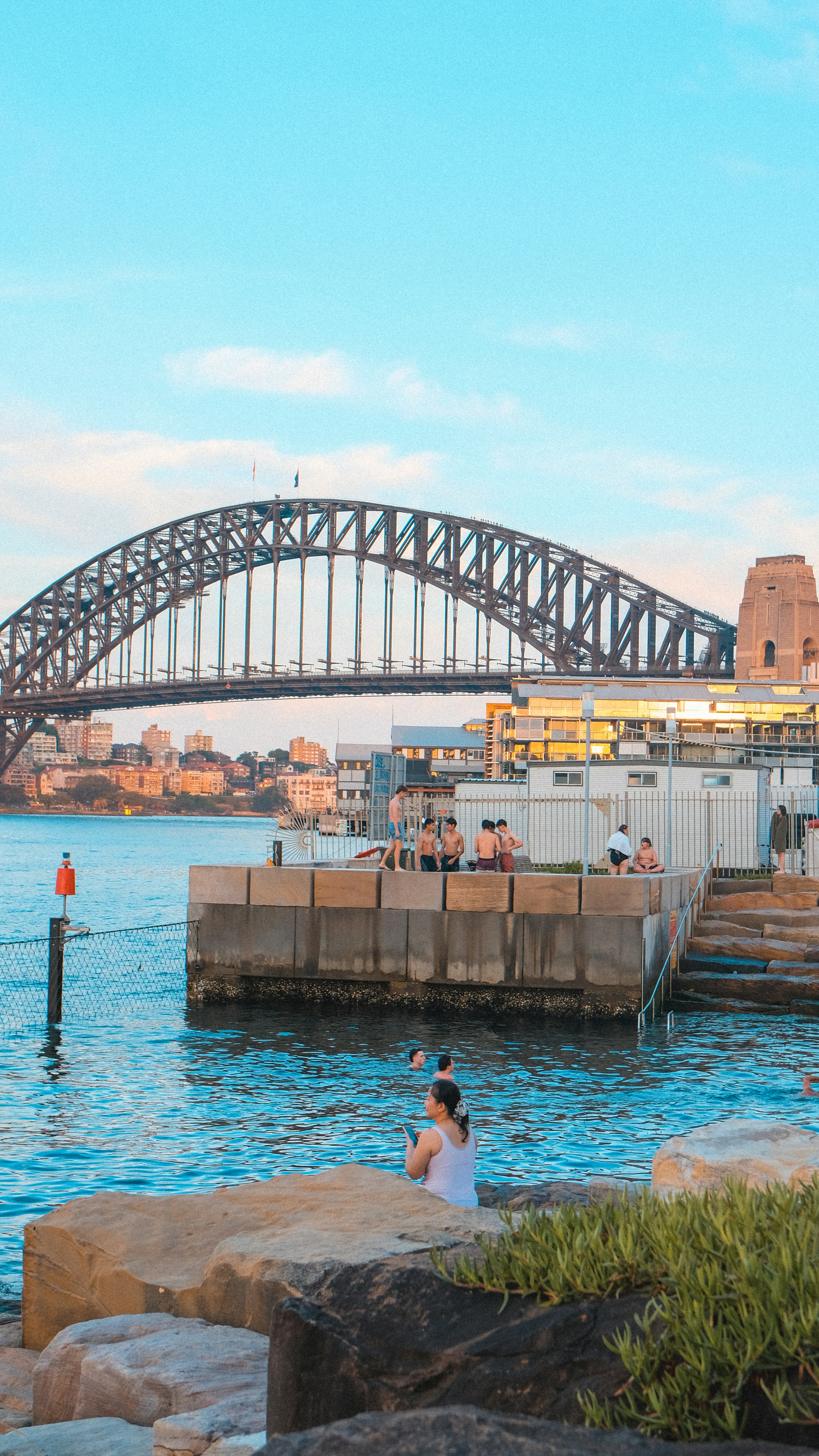 Sunlit Waterfront with the Harbour Bridge Silhouette