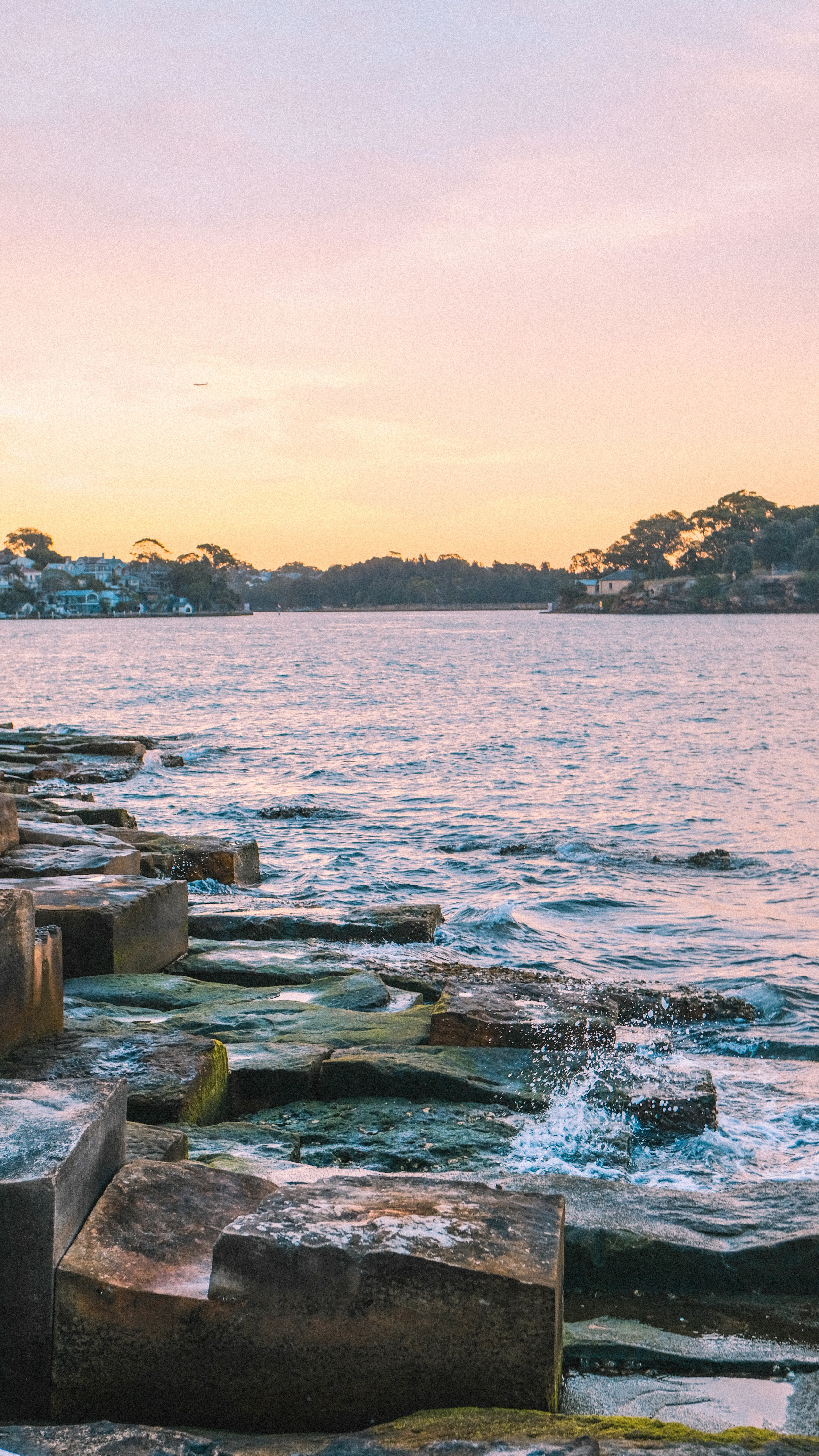 Sunset Over Quiet Breakwaters