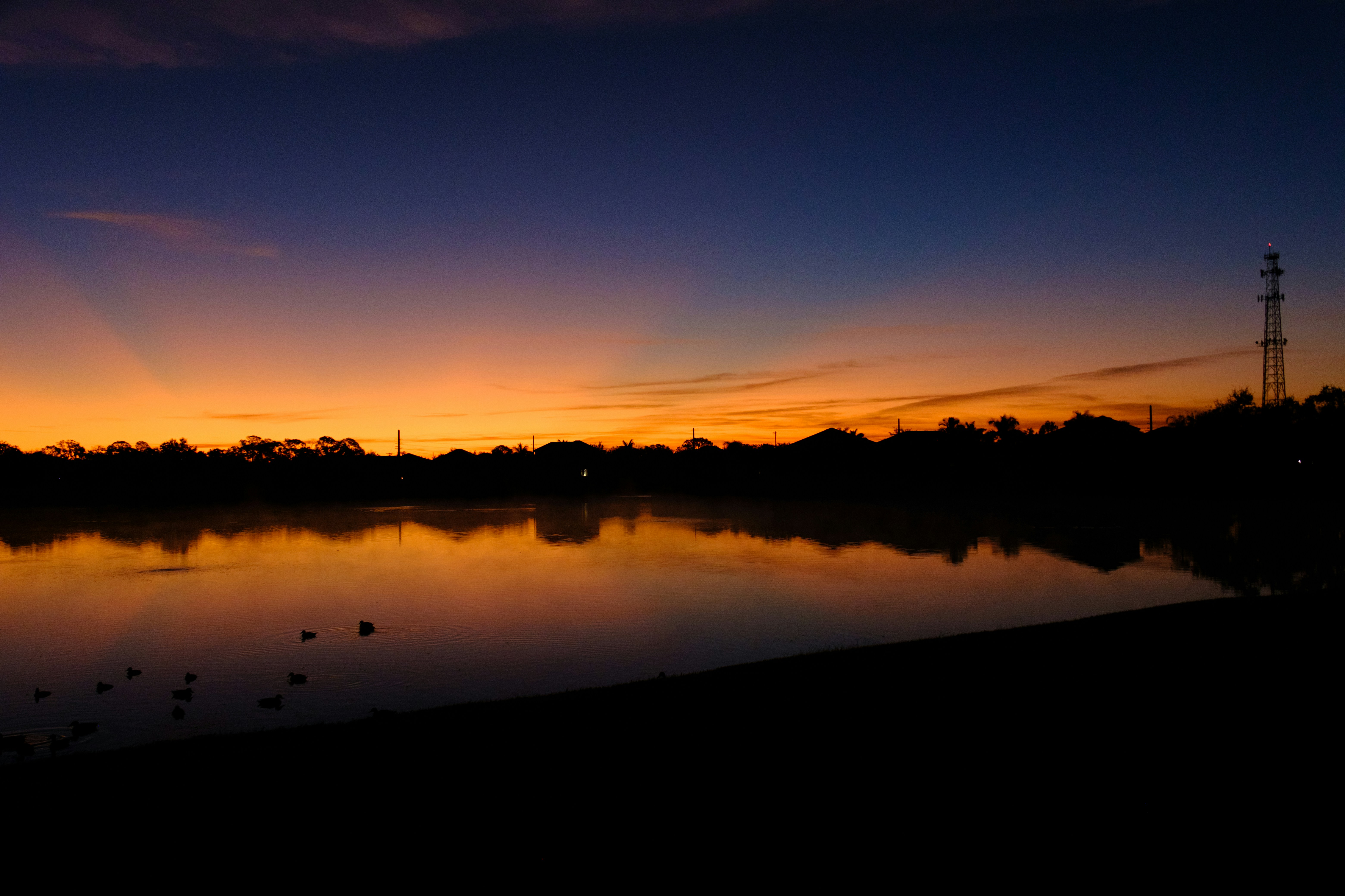 Silenced Horizon: Dusk over Quiet Waters