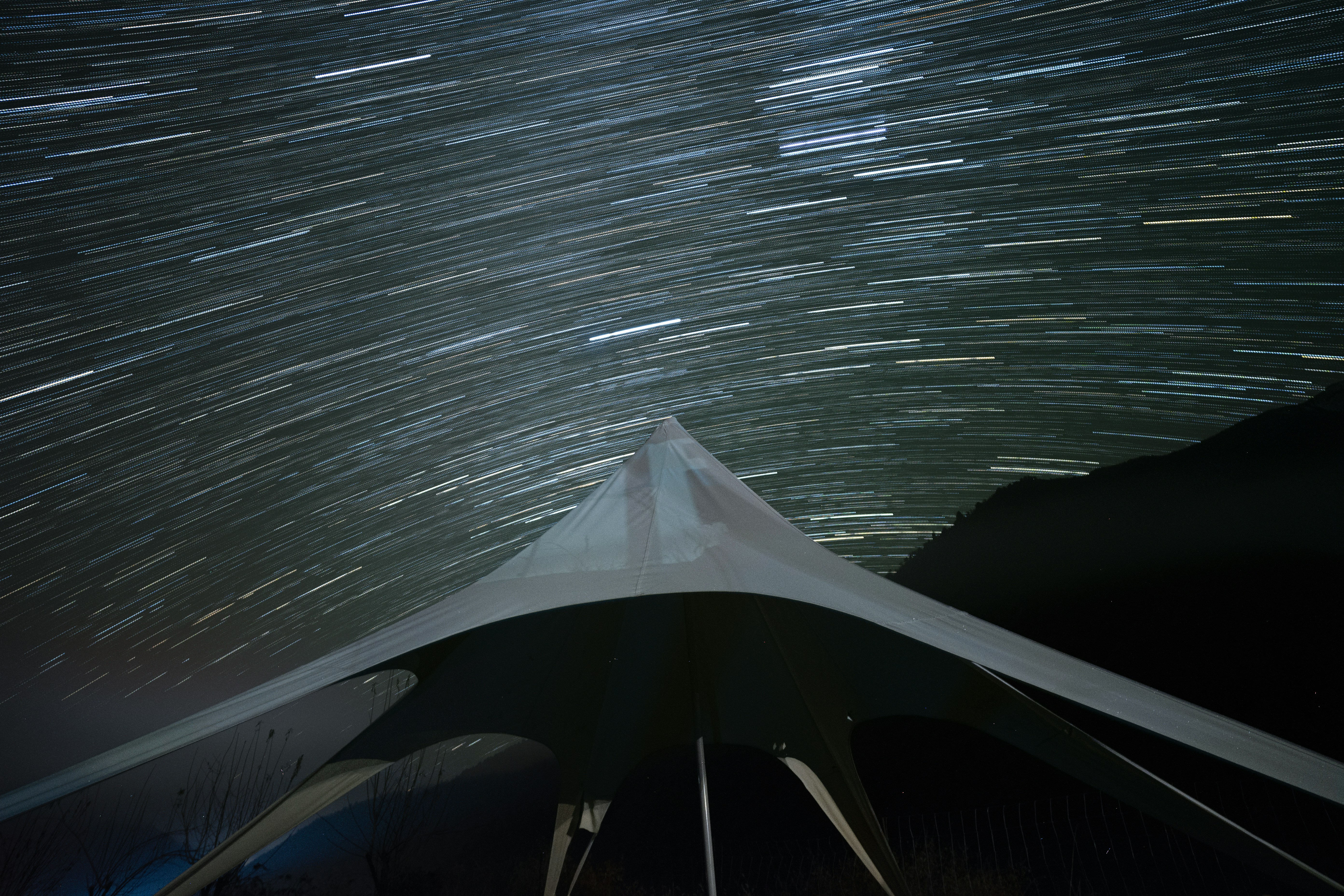Pole Star at the Tent Peak: Star Trails Over a Tented Dome