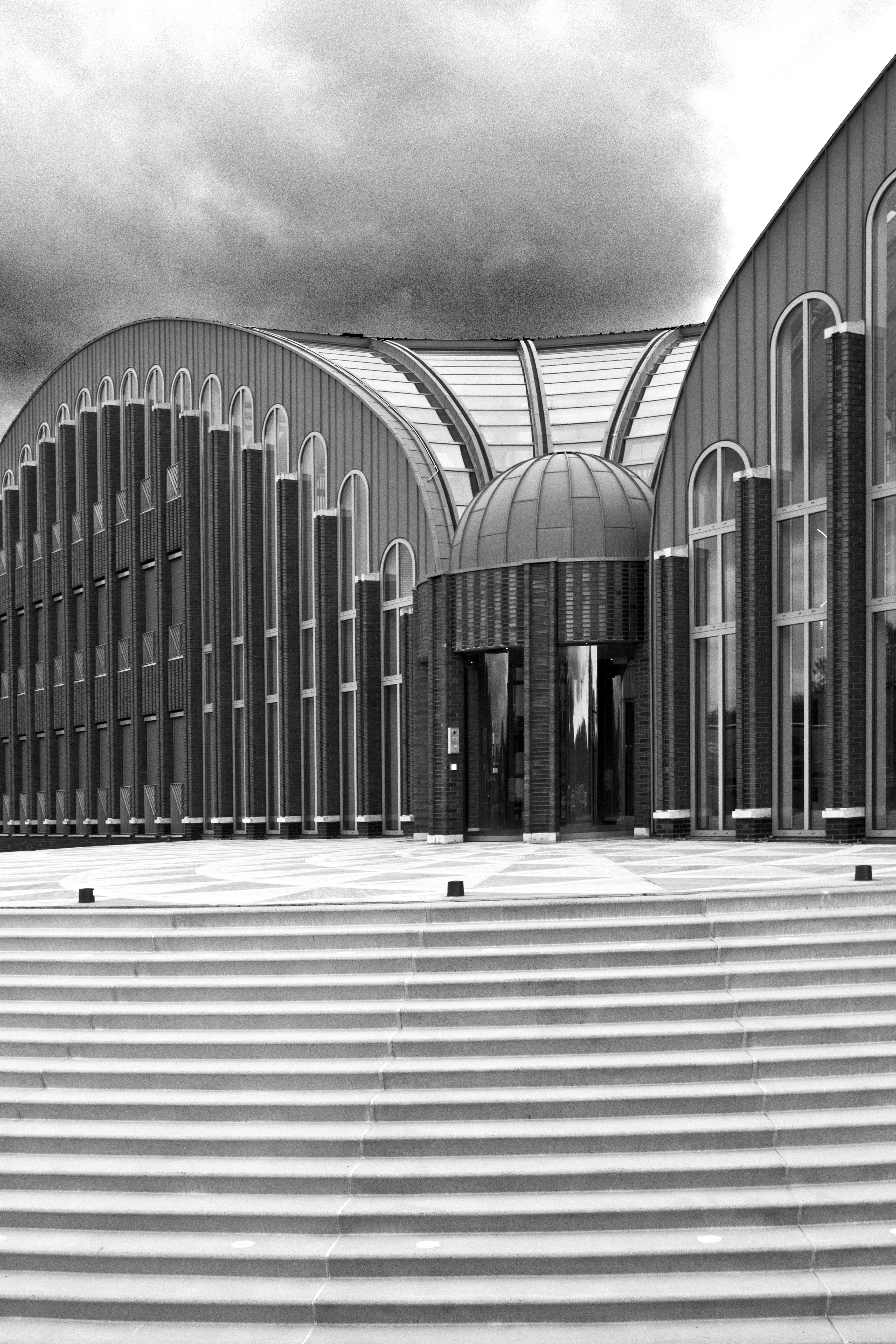 Architectural Symmetry Beneath a Stormy Sky