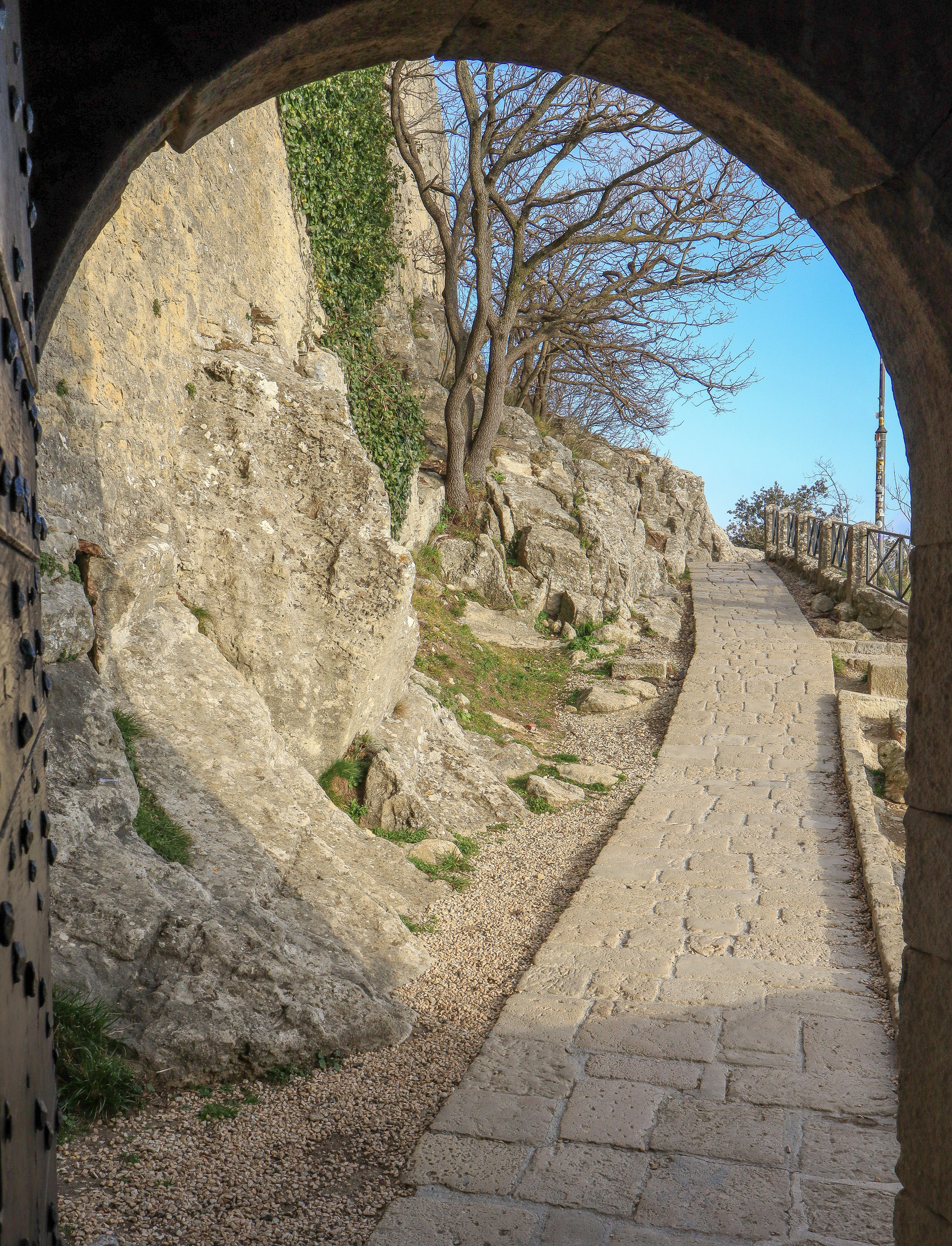 Threshold to the Ridge: A Stone Path Through the Arch