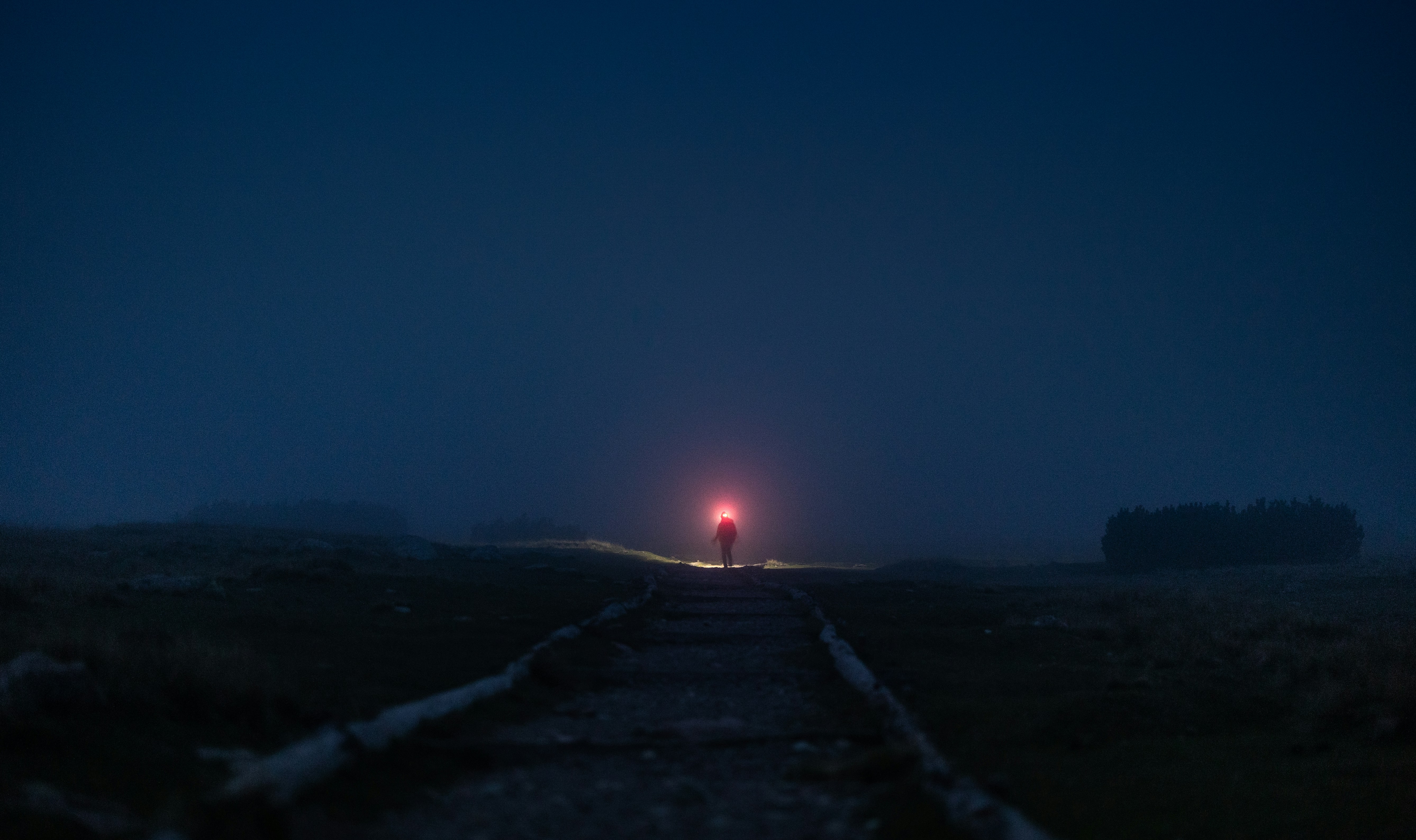 Midnight Beacon: A Single Light Carves the Coastline