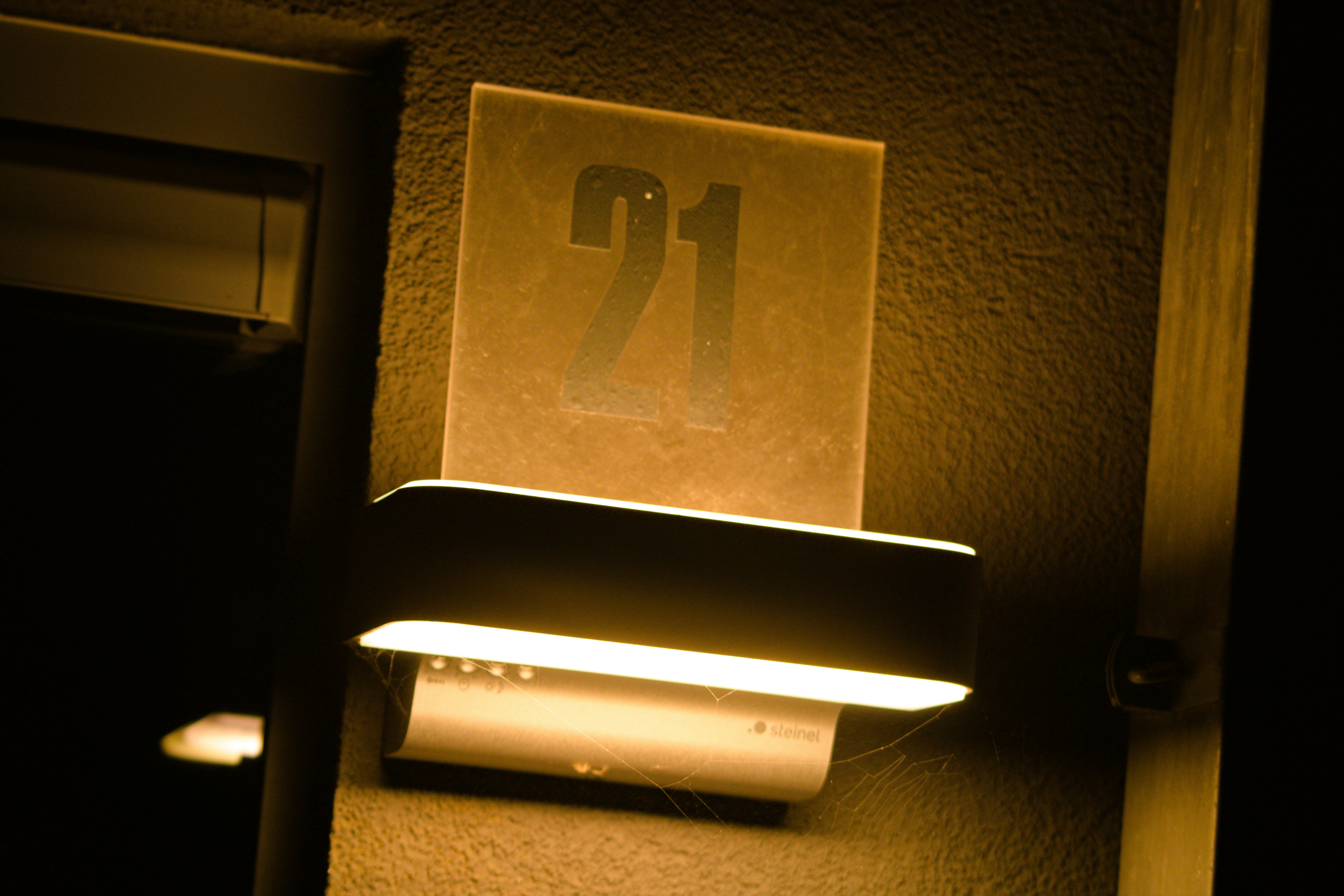 Midnight Doorway: The Quiet Glow of Number Twenty-One