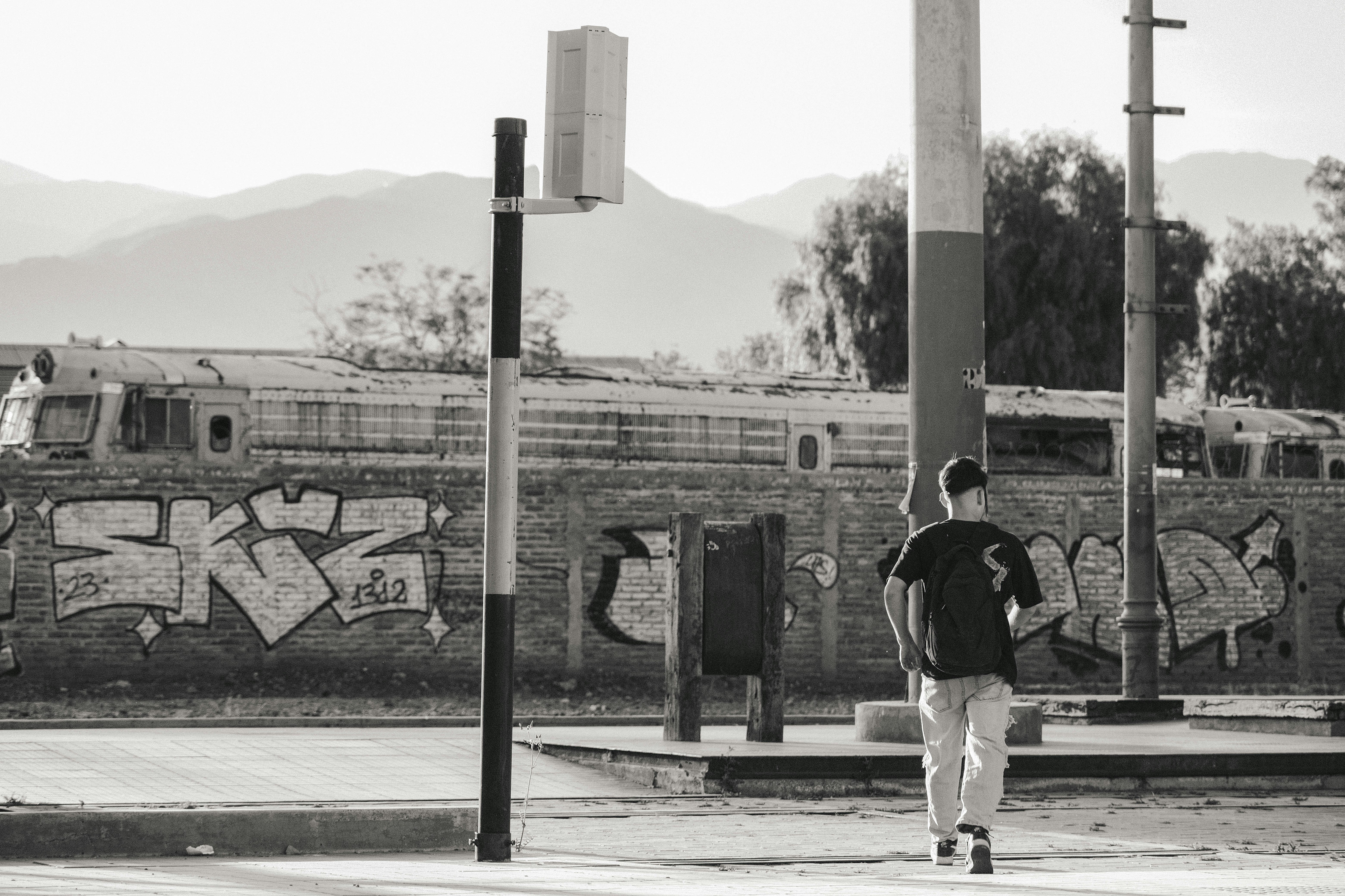 Heading Toward the Tracks: A Solo Moment at the Edge of Graffiti
