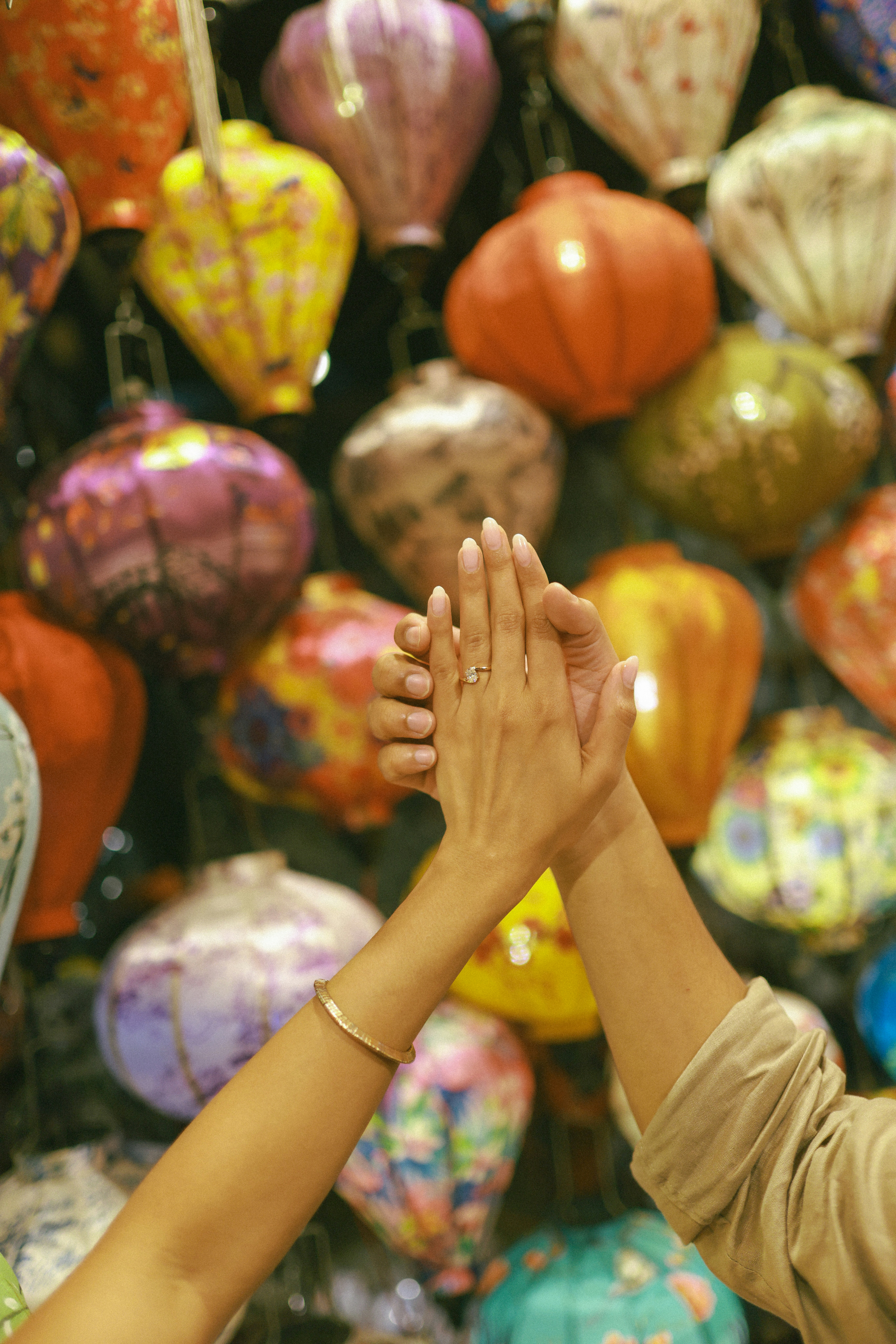 Unified Gesture: Hands Meet in a Burst of Lantern Color