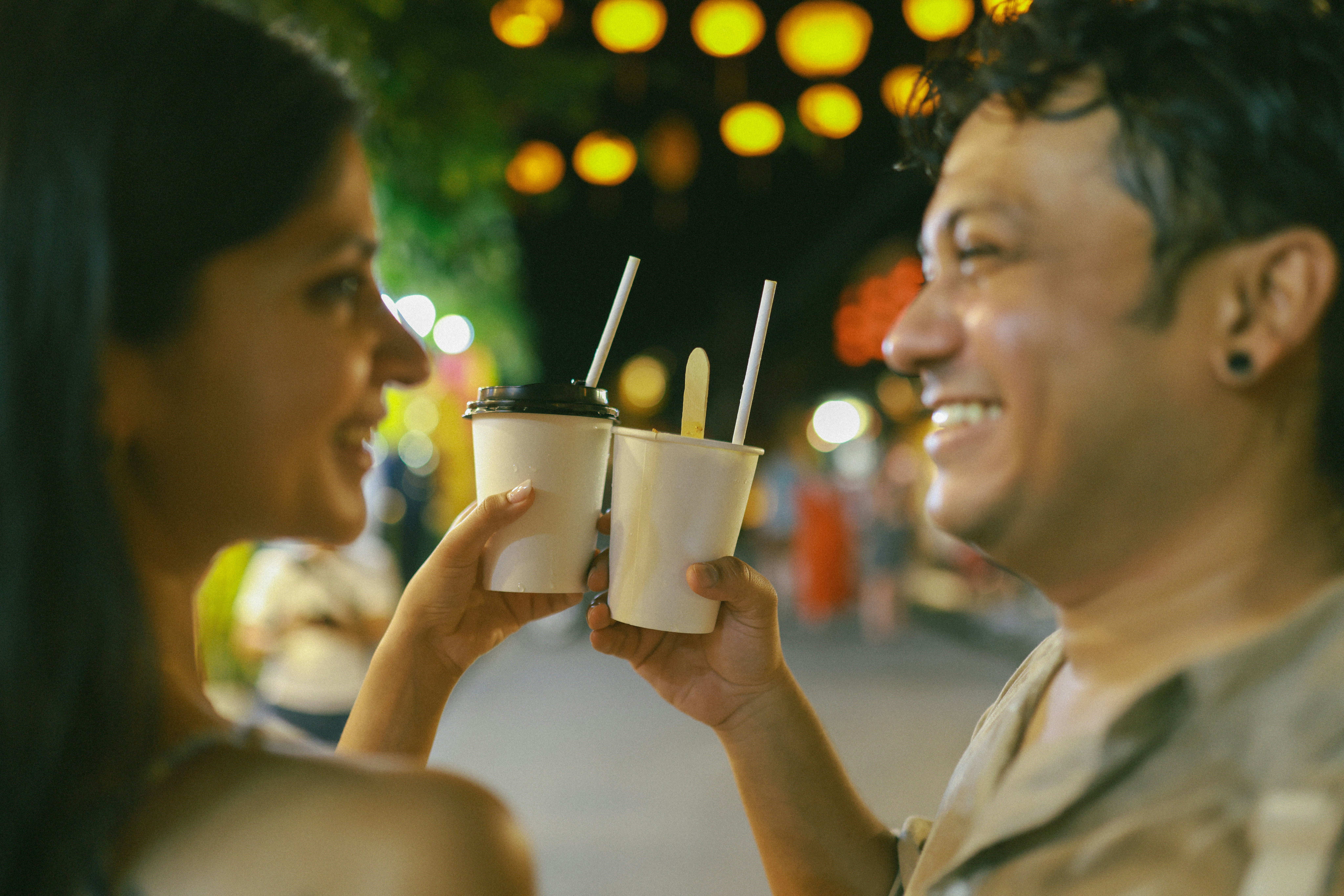Toasted Cheers Under City Lights