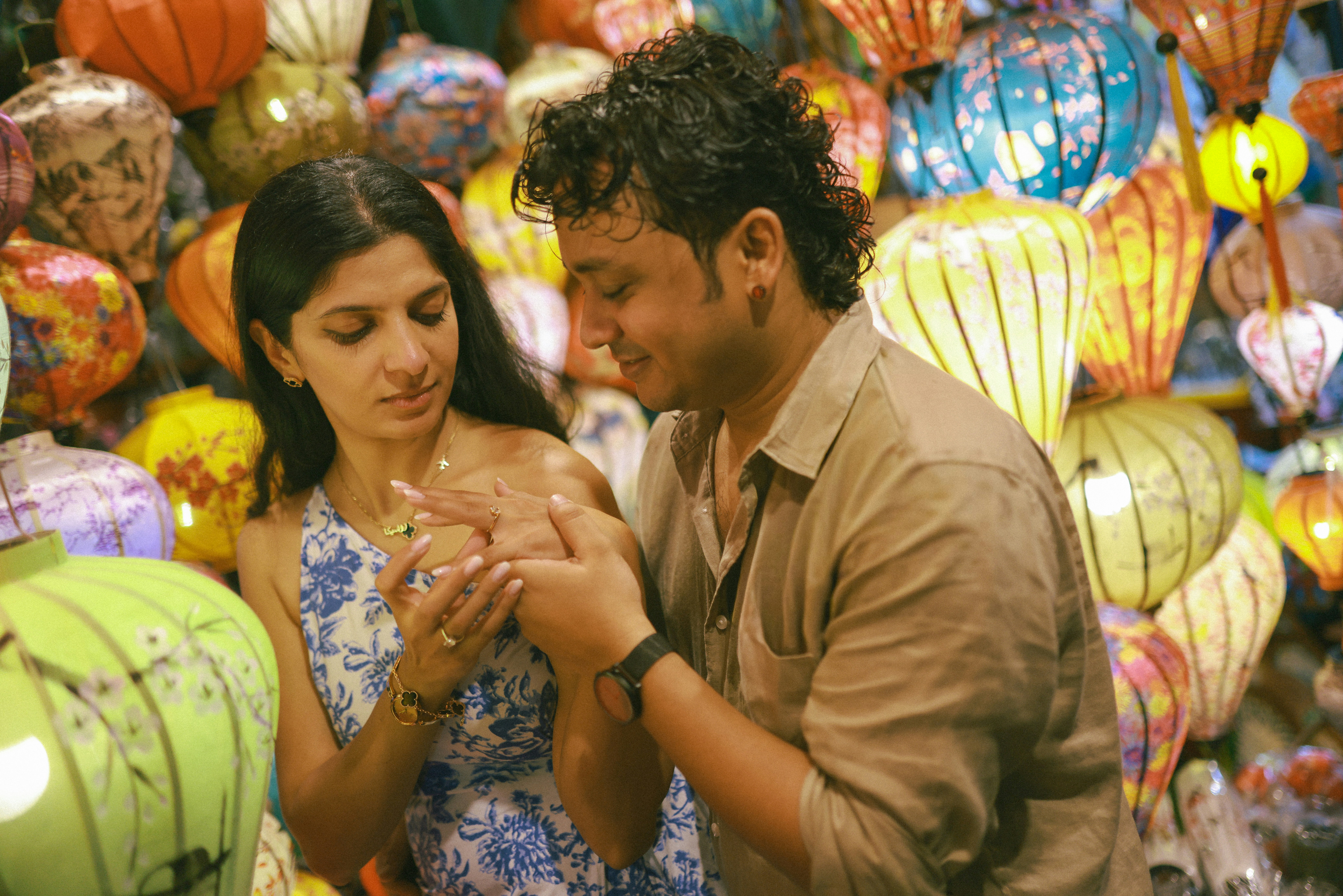Hands of a Moment: A Shared Spark Under Lantern Light