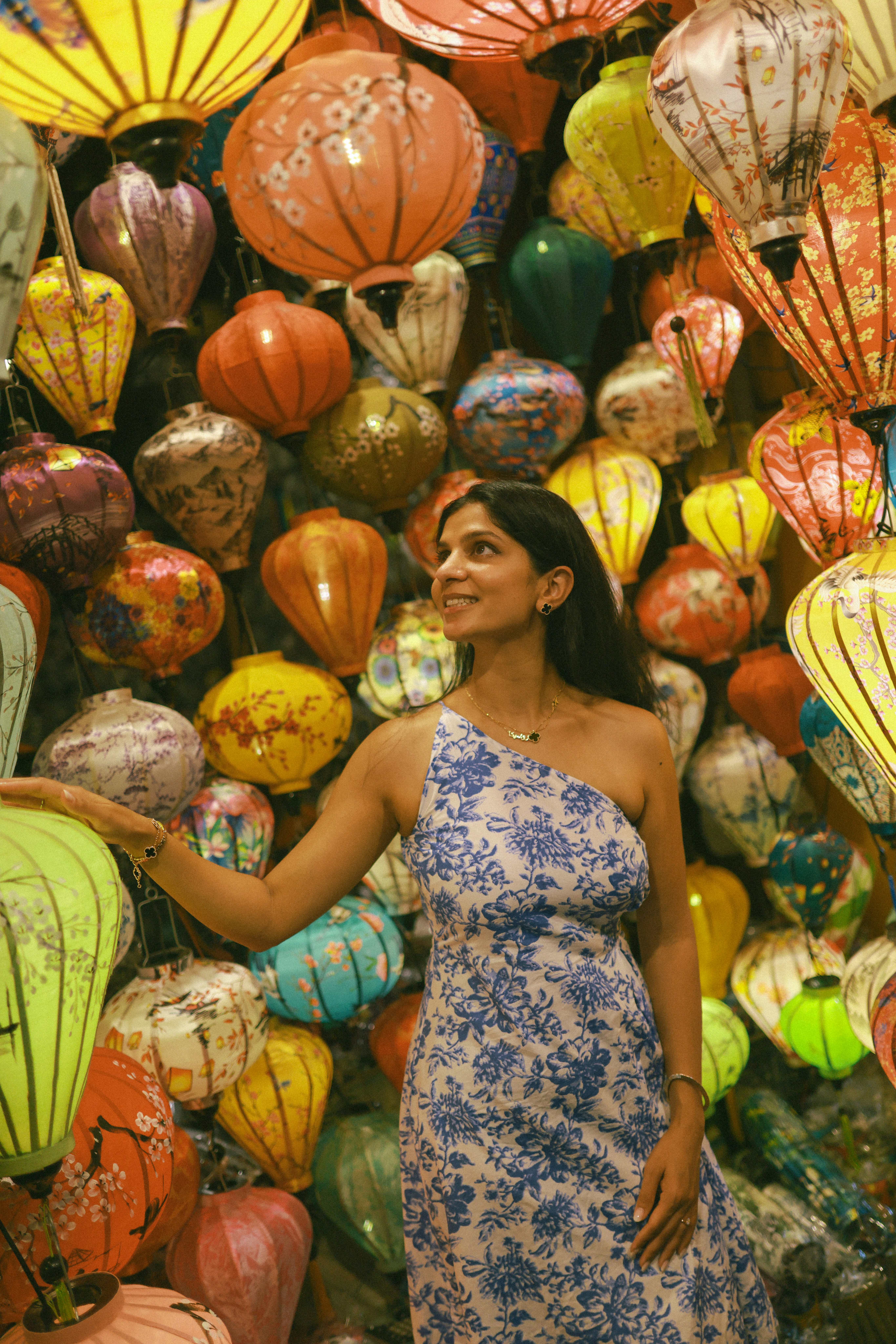Walking Grace Among Lanterns: A Silk dress Amid Lantern Bloom
