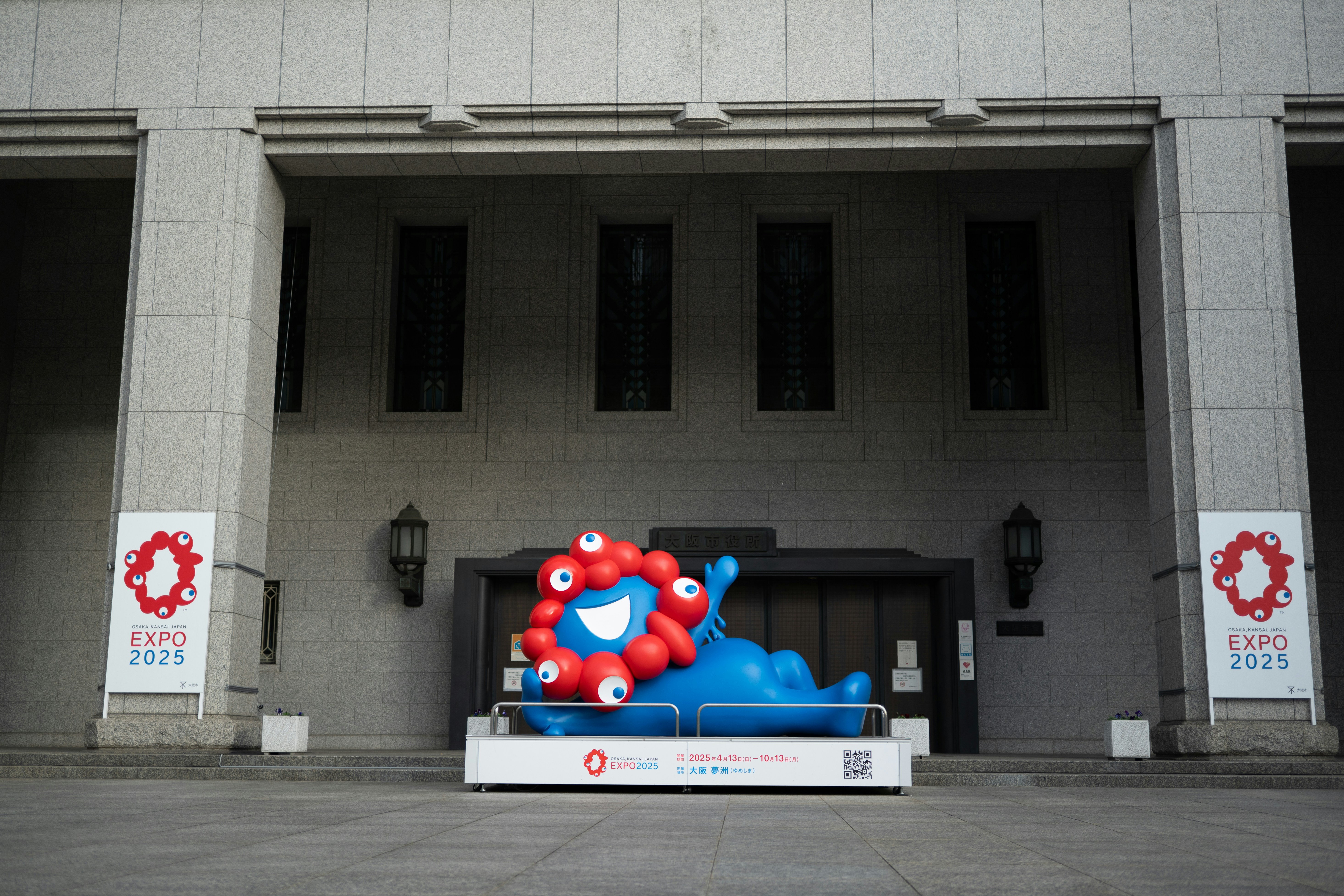 Lunar-blue Dragon Sits Guard at Expo Entrance