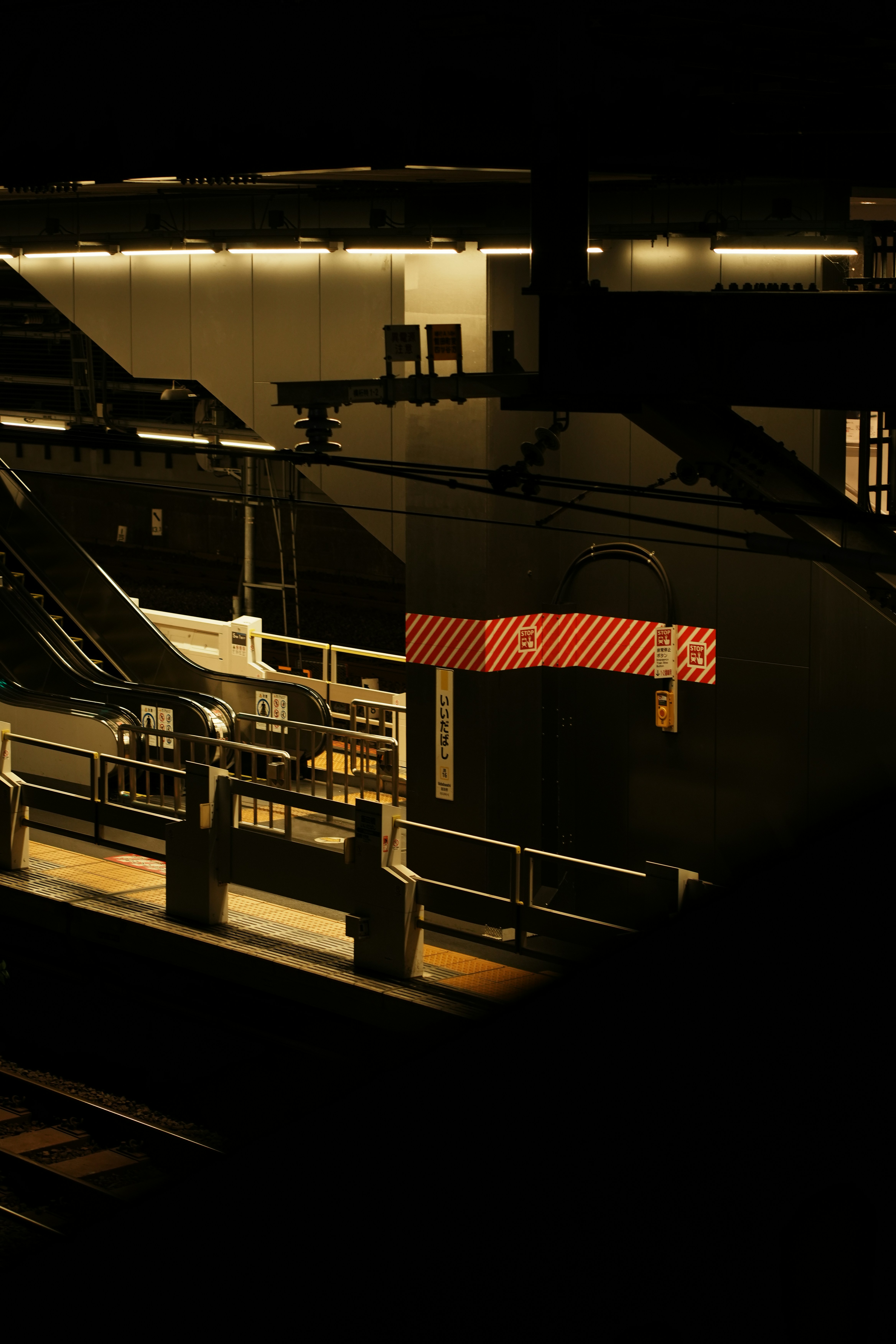 Subway Quiet: A Dimly Lit Platform Emerging from Shadow
