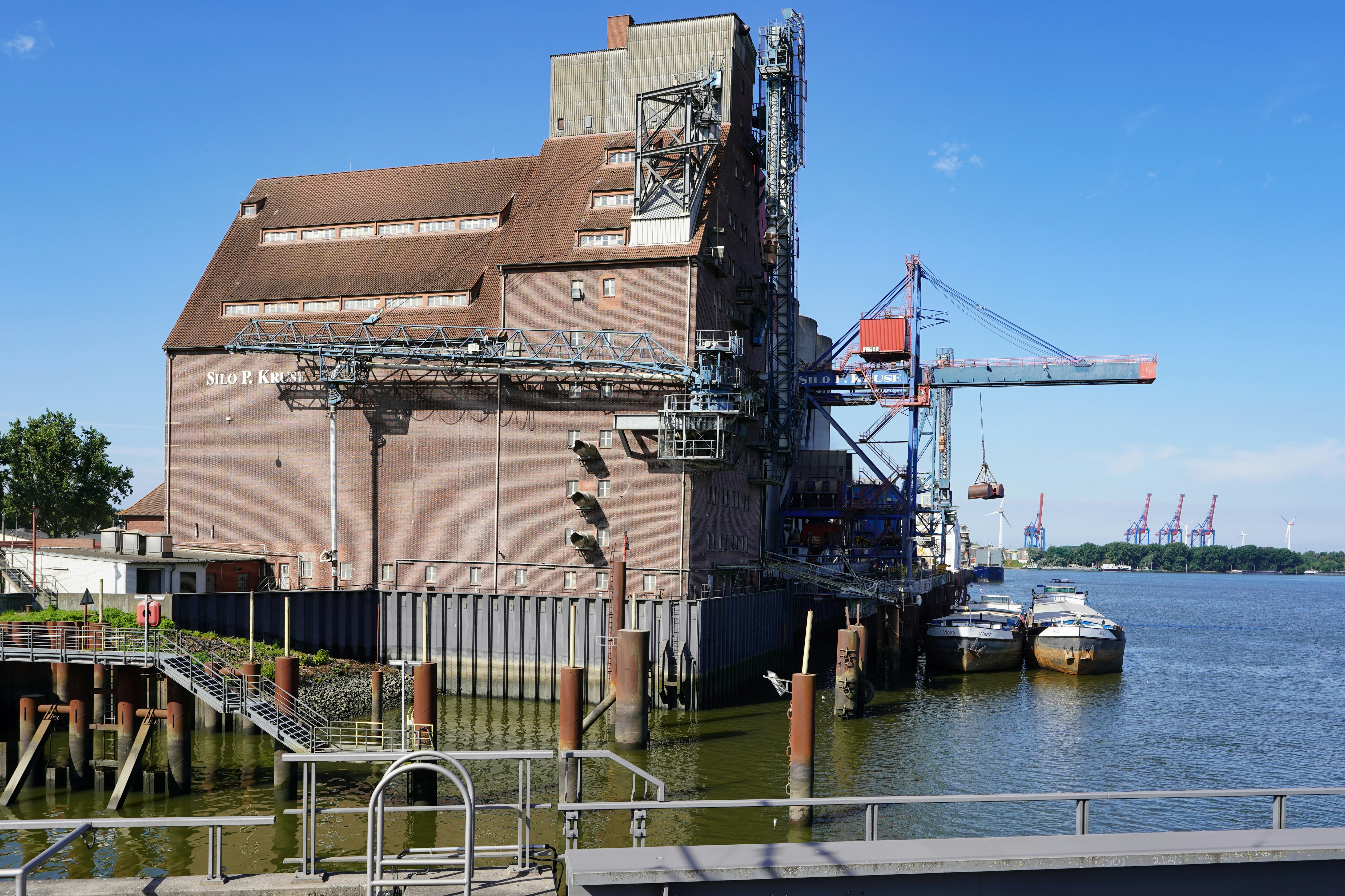 Harborfront Mill: Brick Factory Basking in Morning Light