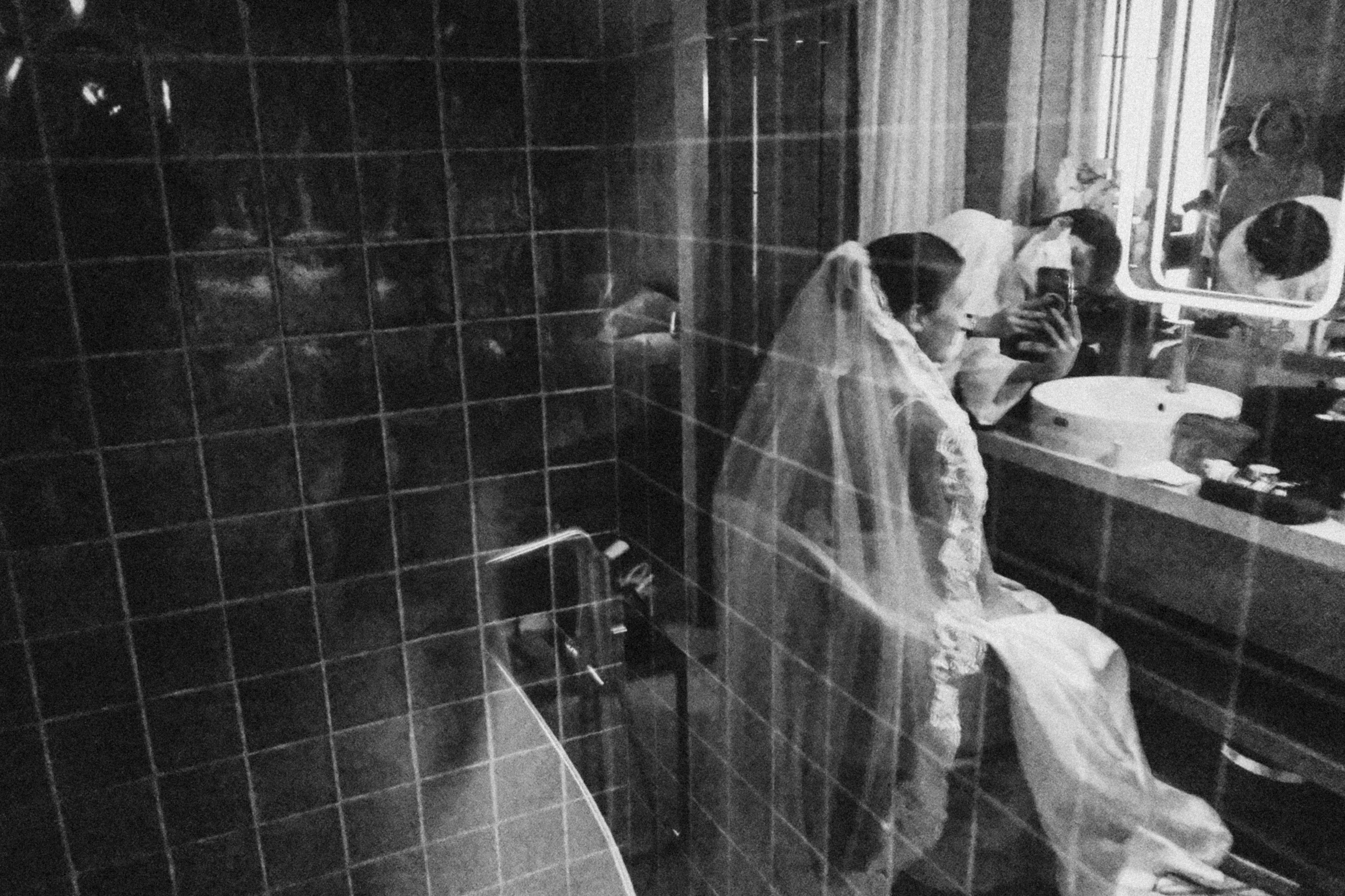 Veiled Reflection: A Quiet Moment in a Shared Space