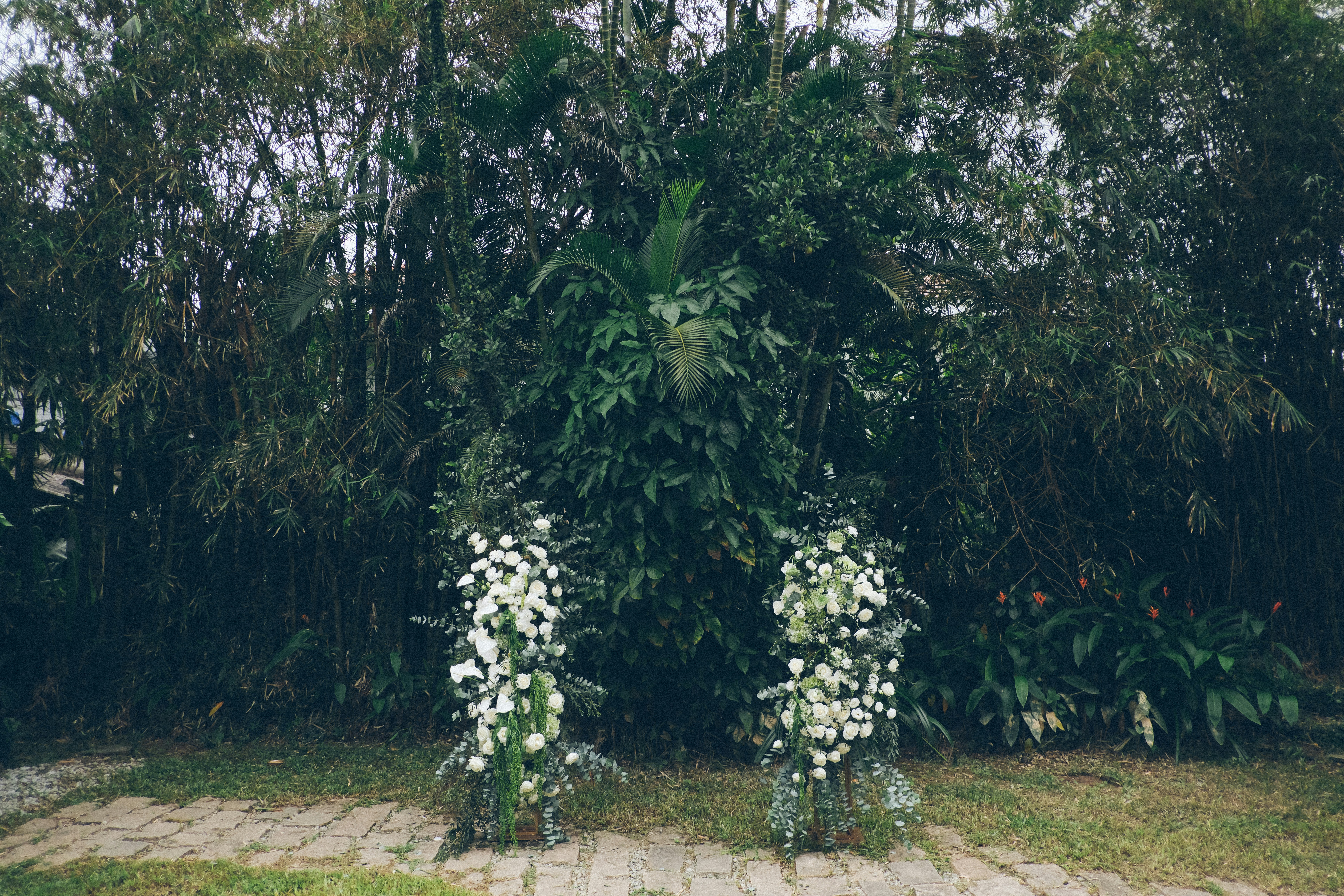 Twin Floral Pillars Along a Quiet Pathway